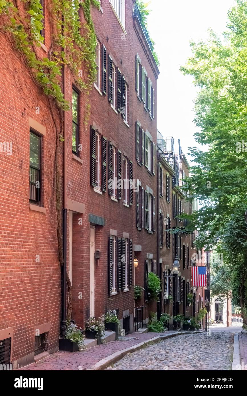 Boston, MA, USA-August 2022; Vertical view down Acorn Street with ...