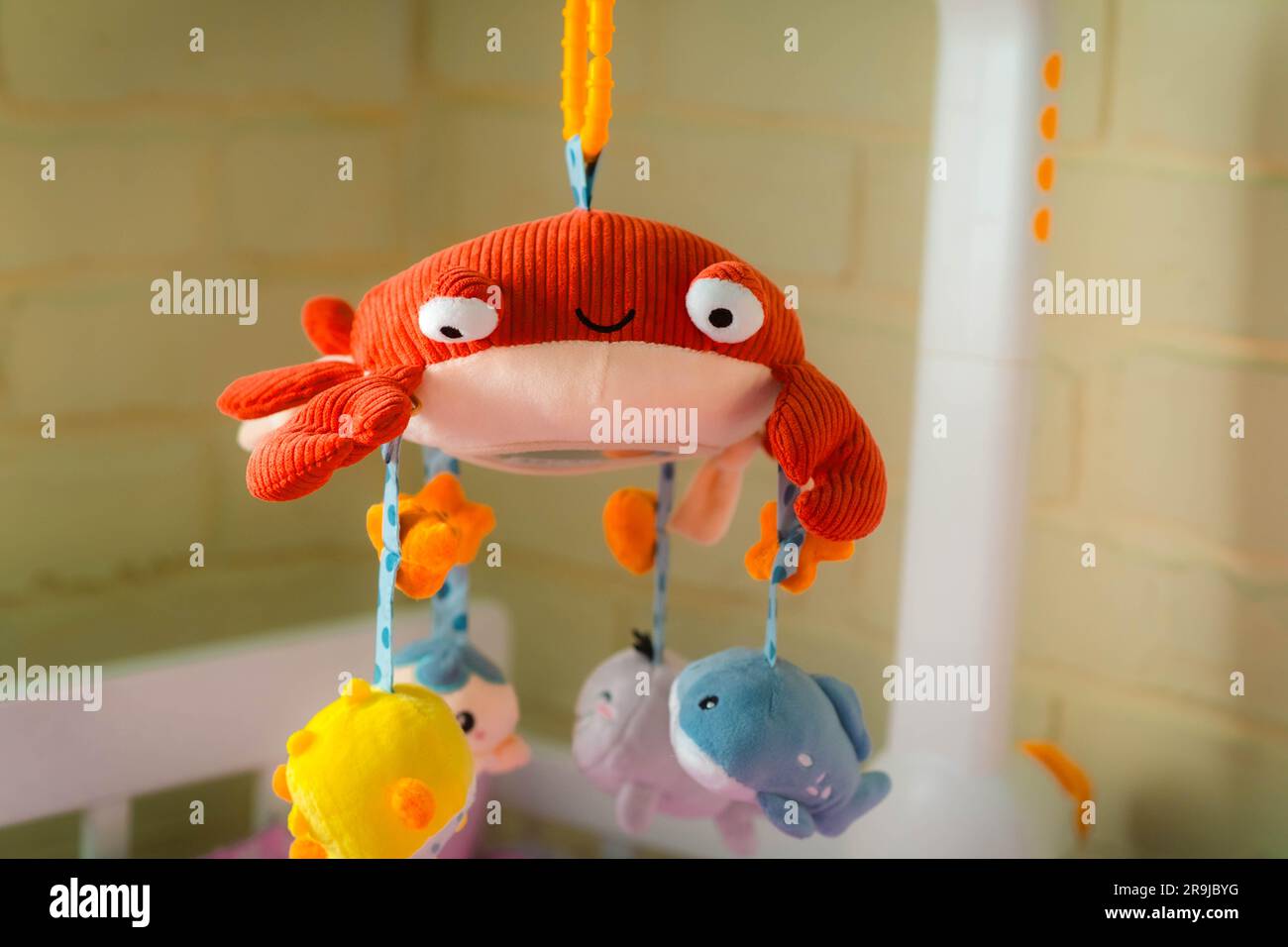 Mobile with soft toys in the crib. Mobile for baby. Children's Toy Red ...