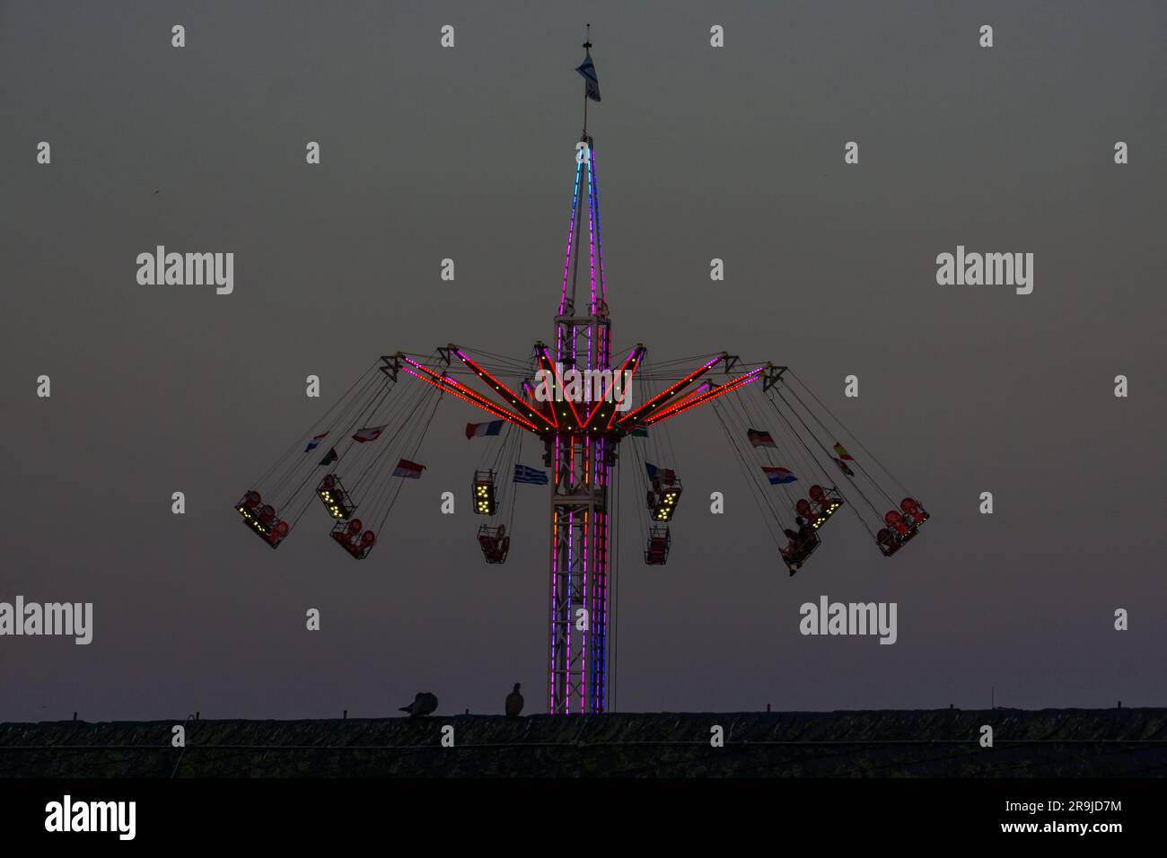 high chain carousel of a funfair Stock Photo - Alamy