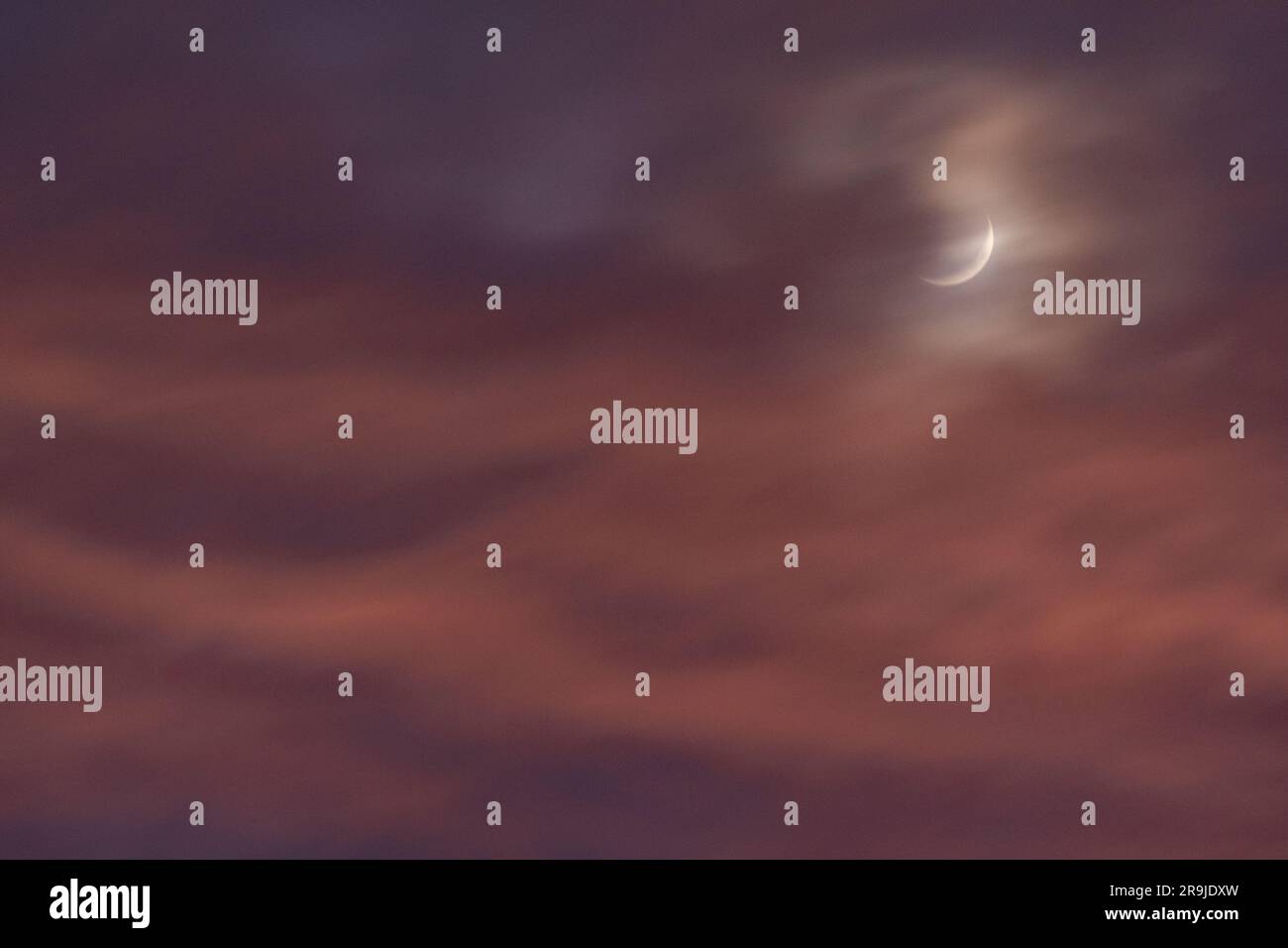 Sunset clouds moon hi-res stock photography and images - Alamy