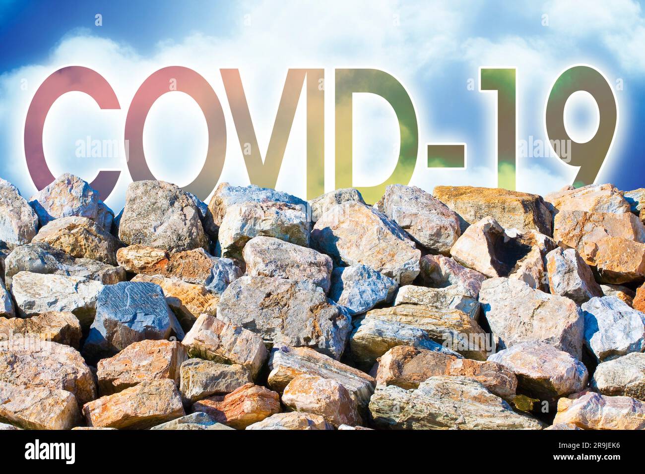 Embankment wall with large stone blocks against COVID-19 Coronavirus ...