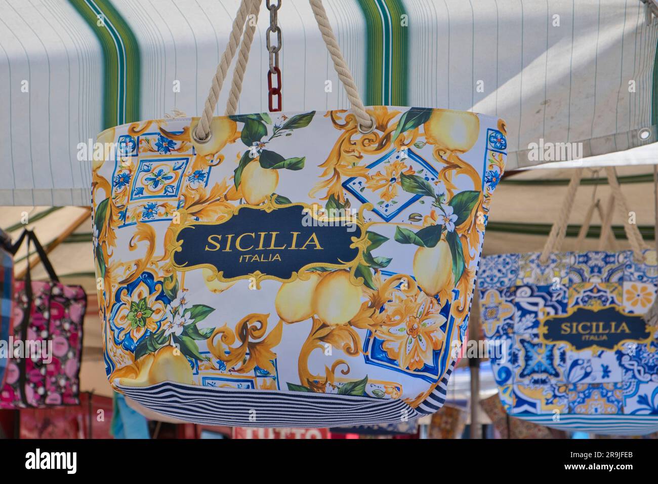 Selling typical bags at a market in Sicily, southern Italy Stock Photo ...