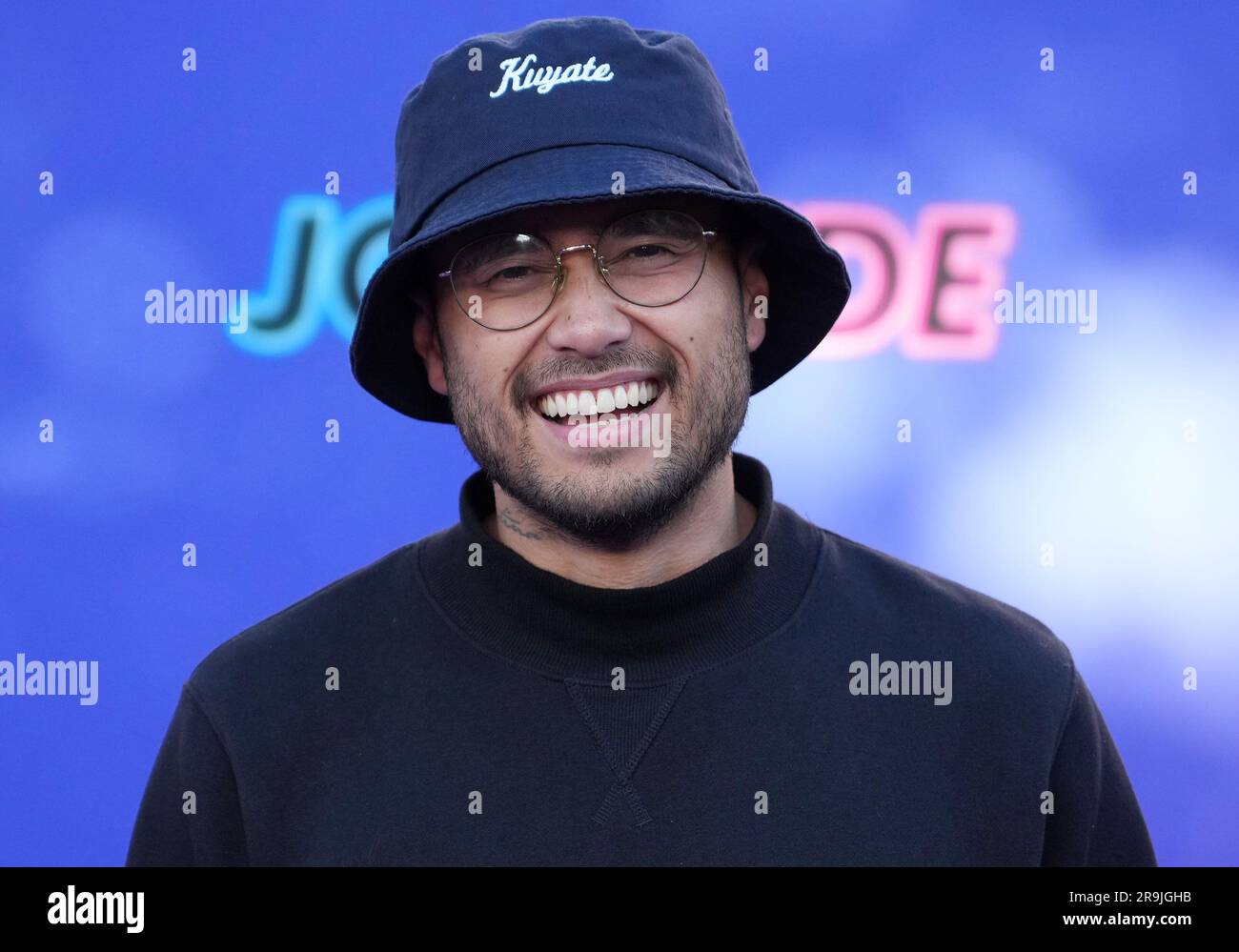Travis Atreo arrives at the Lionsgate's JOY RIDE Los Angeles Premiere ...