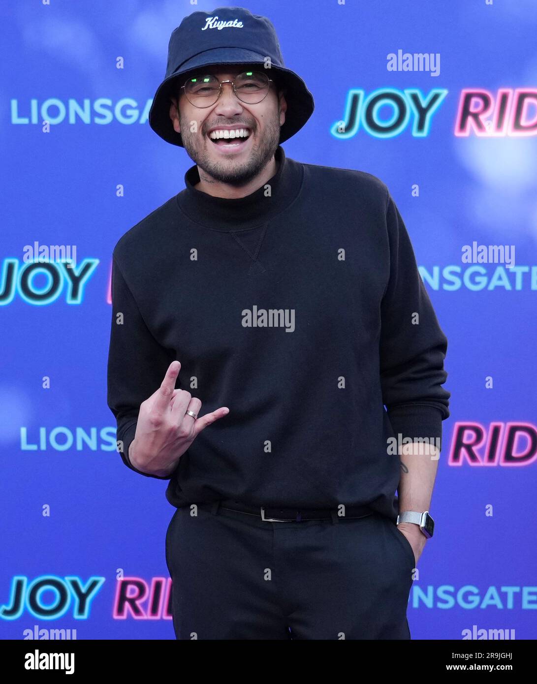 Travis Atreo arrives at the Lionsgate's JOY RIDE Los Angeles Premiere ...