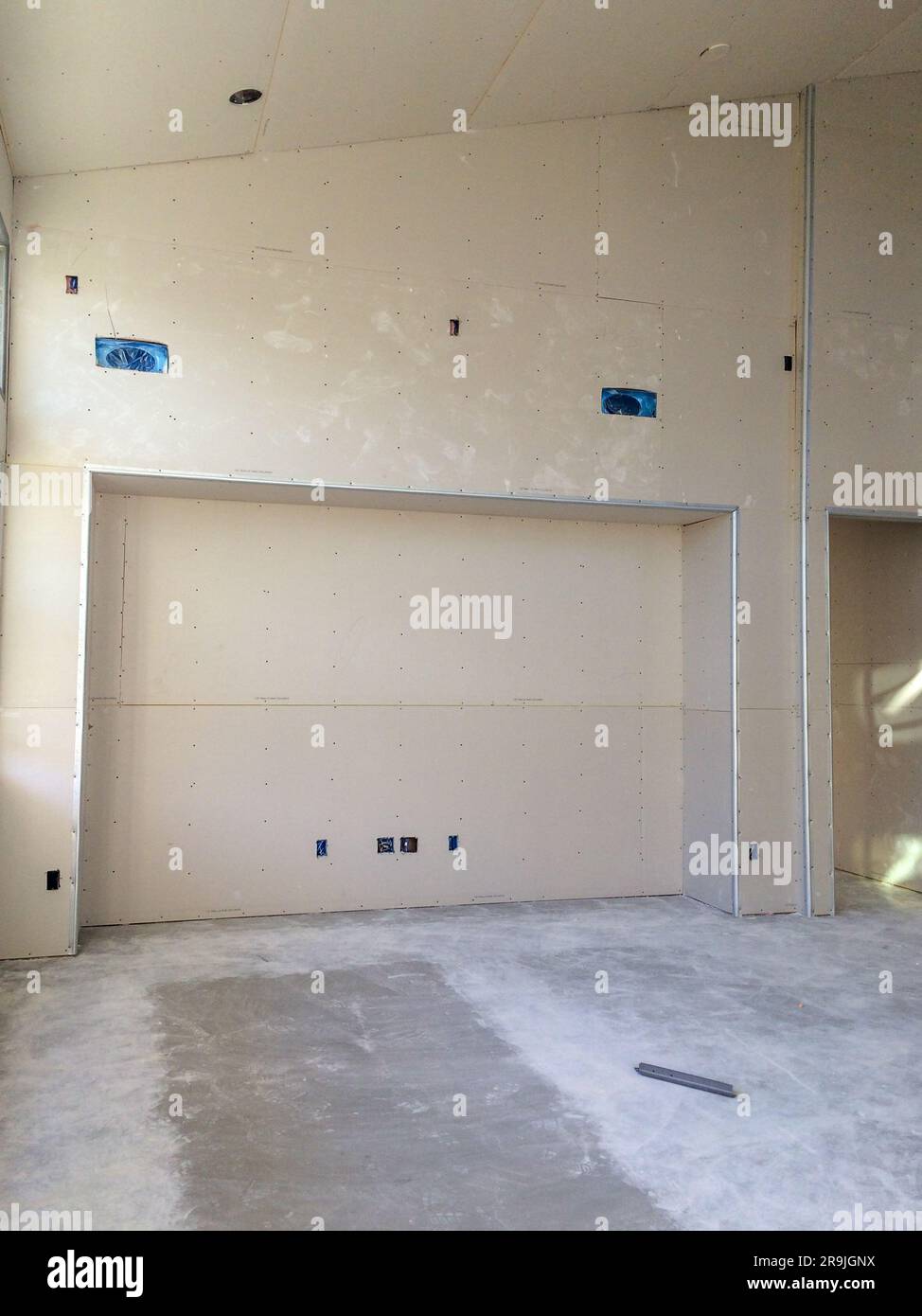 Construction of new home interior drywall installation and finish ...