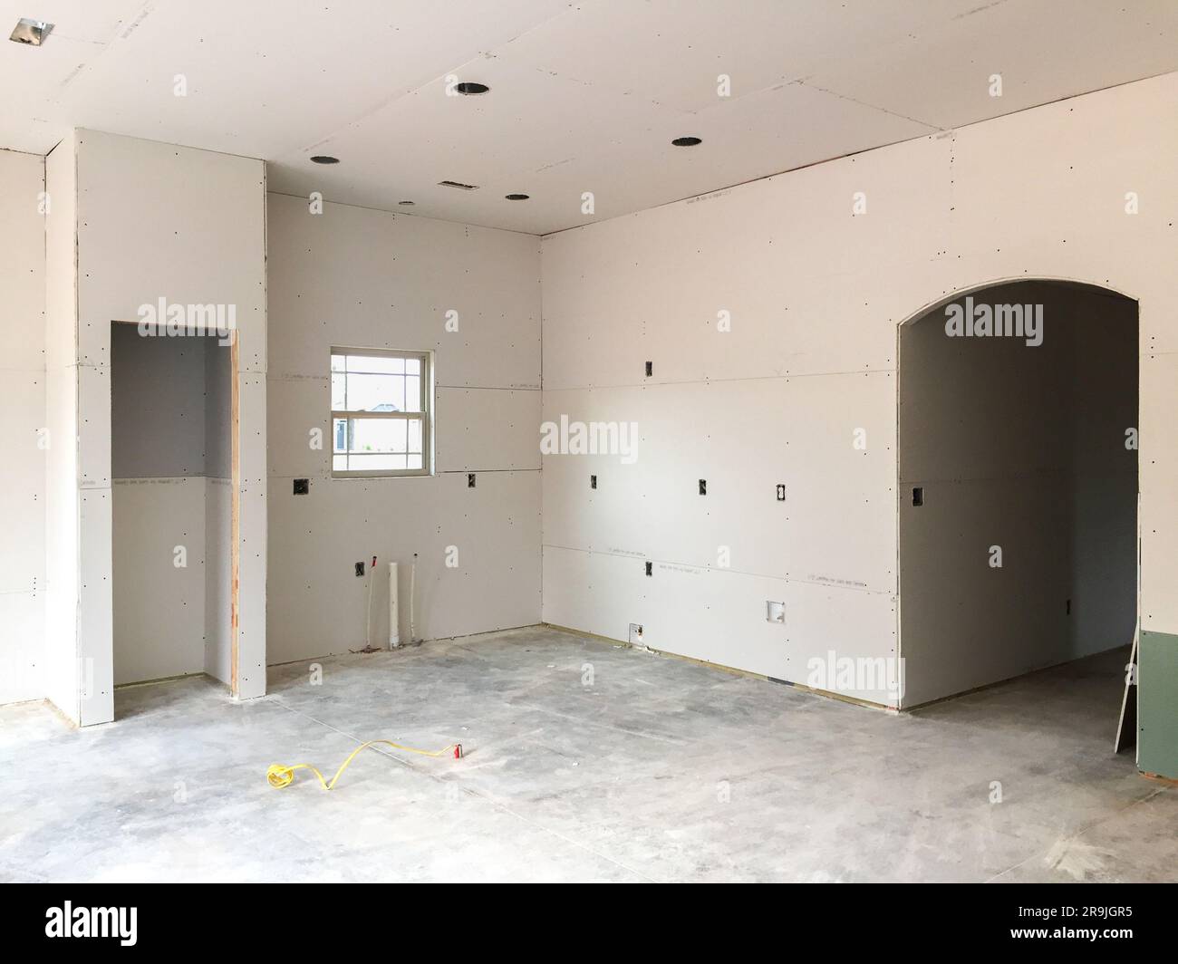 Construction of new home interior drywall installation and finish ...