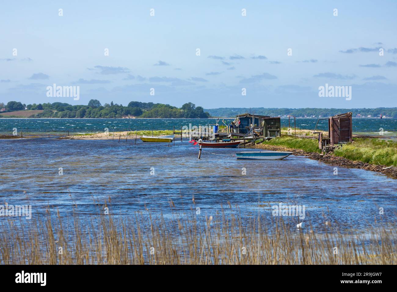 Fishing boats and run-down huts at Catherinesminde, Broager, Denmark ...