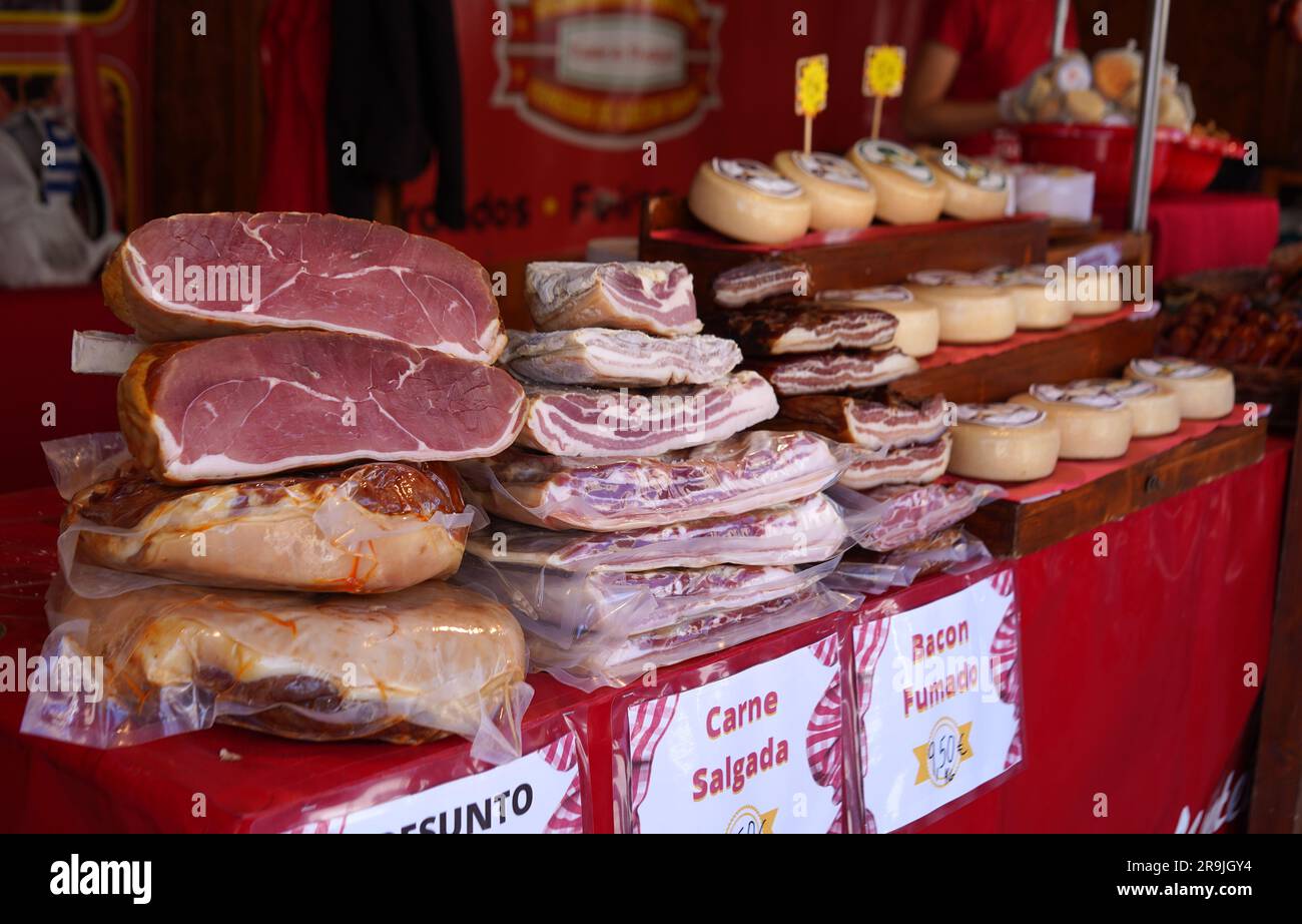 Traditional presunto ham sold at farmers market stall Stock Photo - Alamy