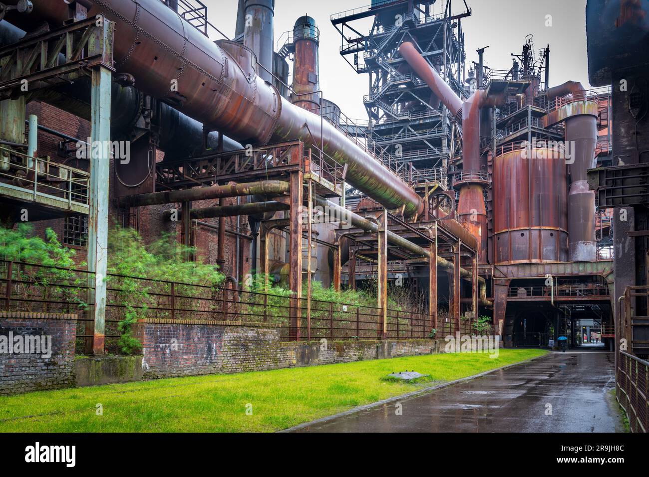 An old aged and abandoned factory in the countryside on a gloomy day ...