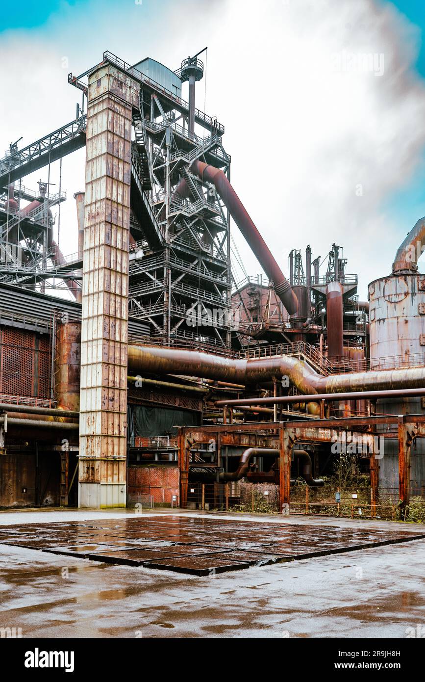 An old aged and abandoned factory in the countryside on a gloomy day ...