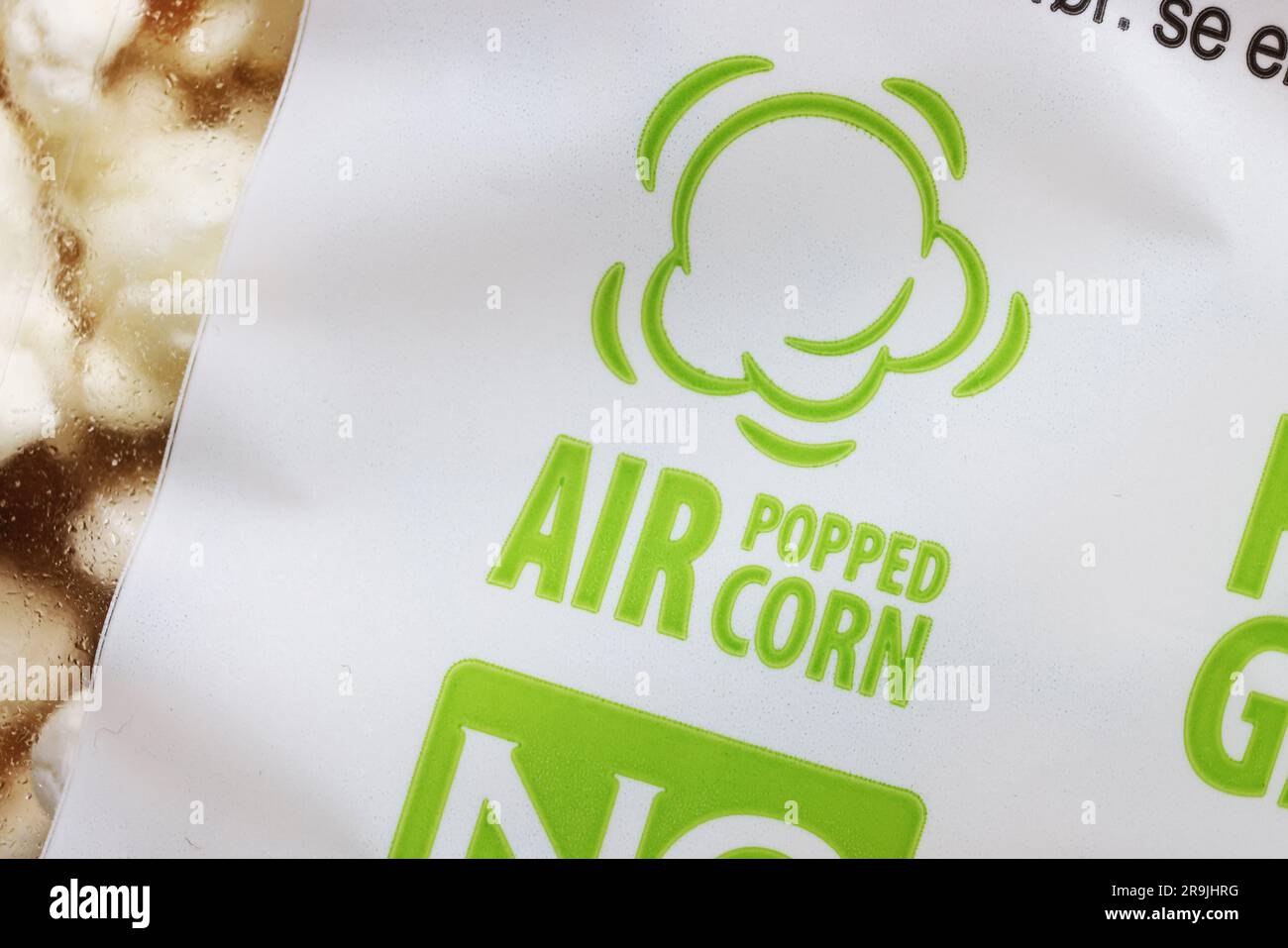 Signs and symbols, a popcorn package Stock Photo - Alamy