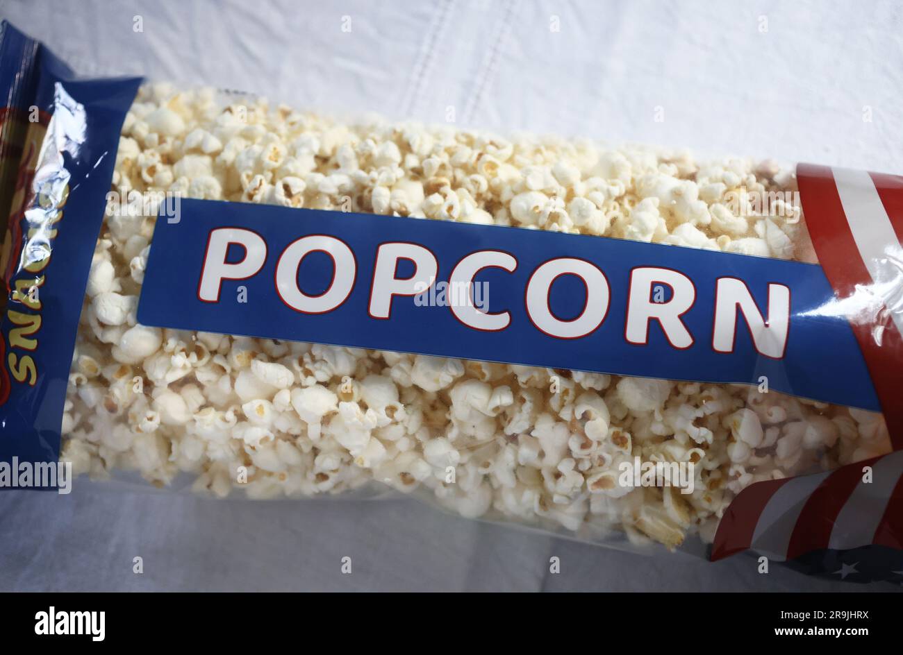 Signs and symbols, a popcorn package Stock Photo - Alamy