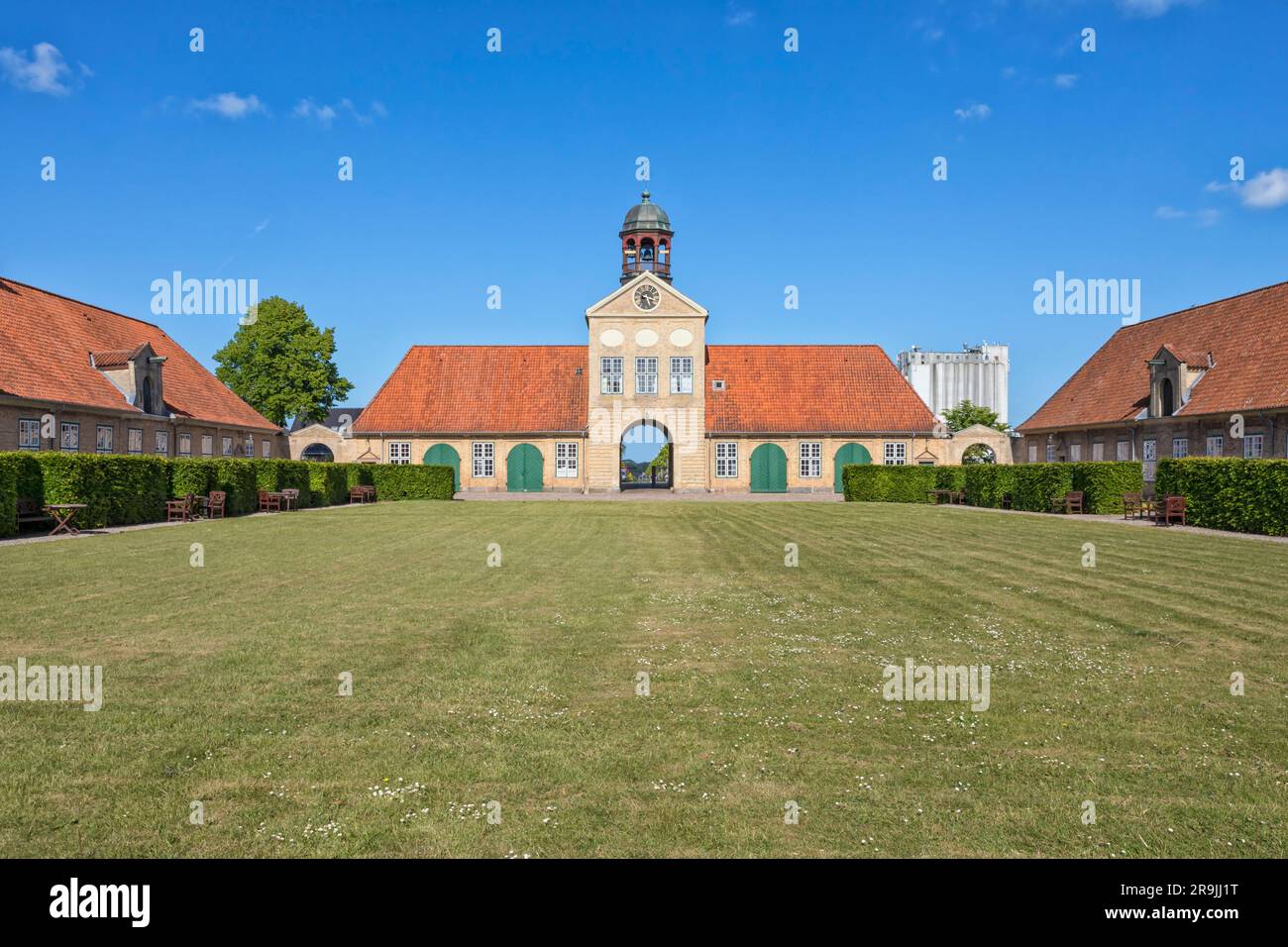 Farm buildings and gatehouse with clocktower at Augustenborg Palace ...