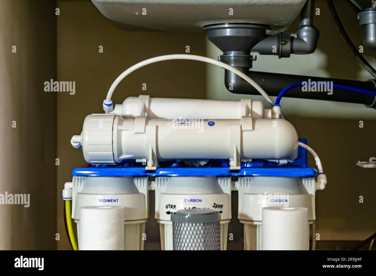 Photography to theme water filter system for home on background kitchen ...