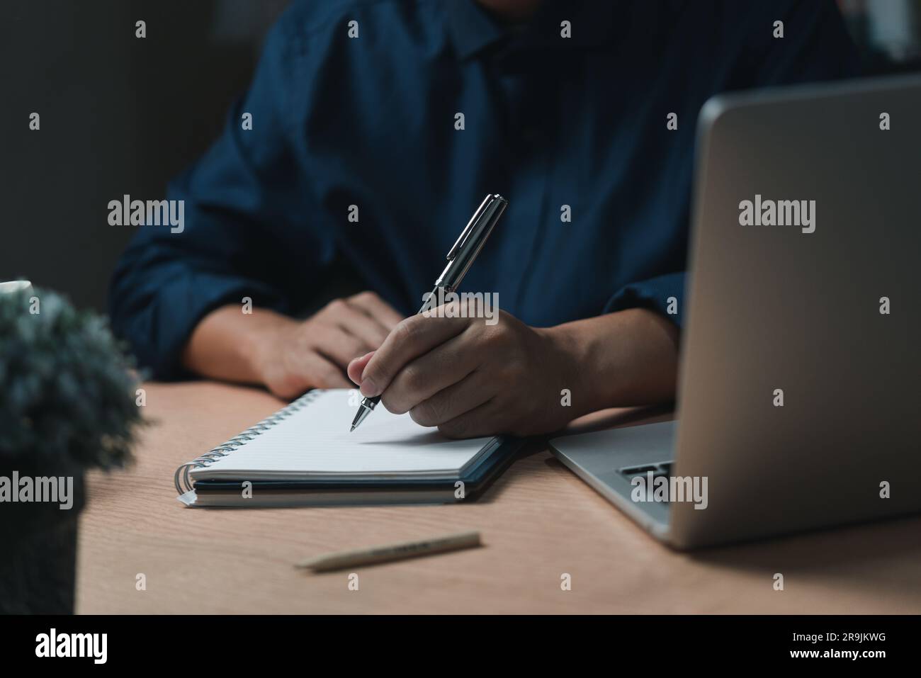 Businessperson reading and writing on book.education studying knowledge ...