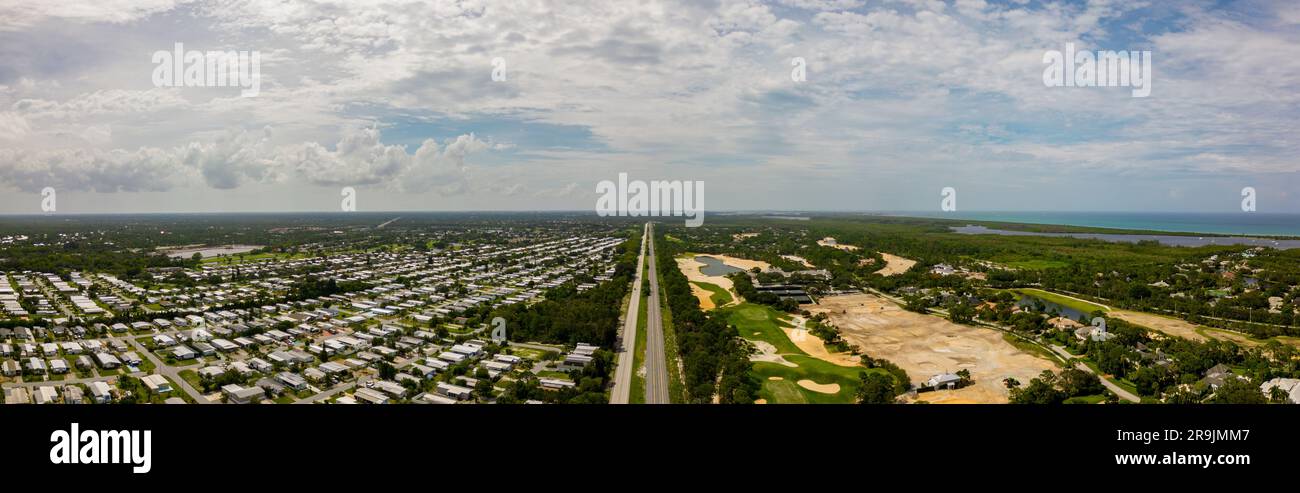Aerial drone photo of railroad tracks seperating upper class ...
