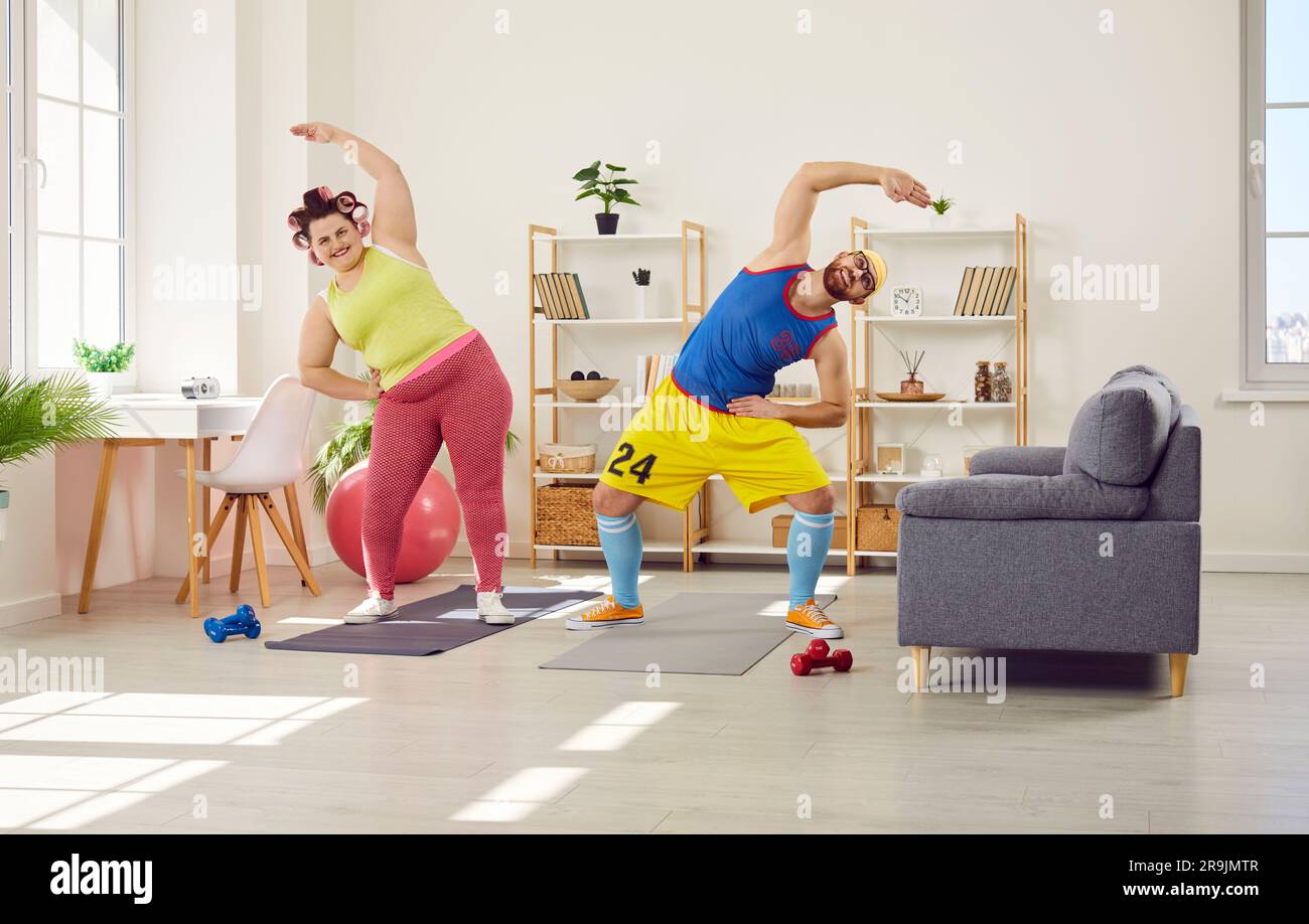 Overweight couple doing exercises hi-res stock photography and images ...