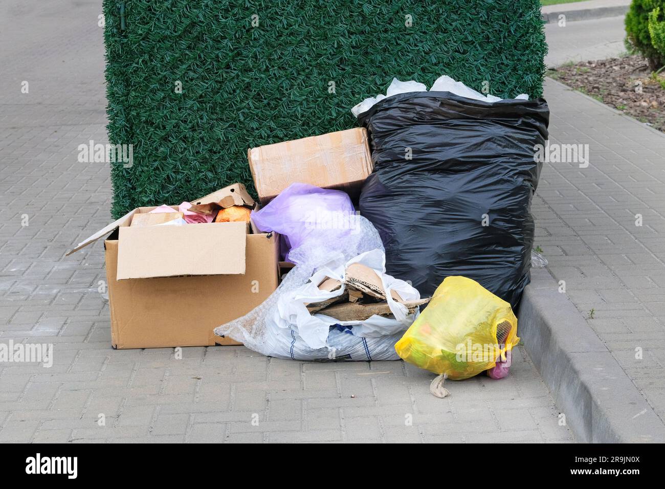 Dumpsters being full with garbage in the park. Garbage waste lots junk ...