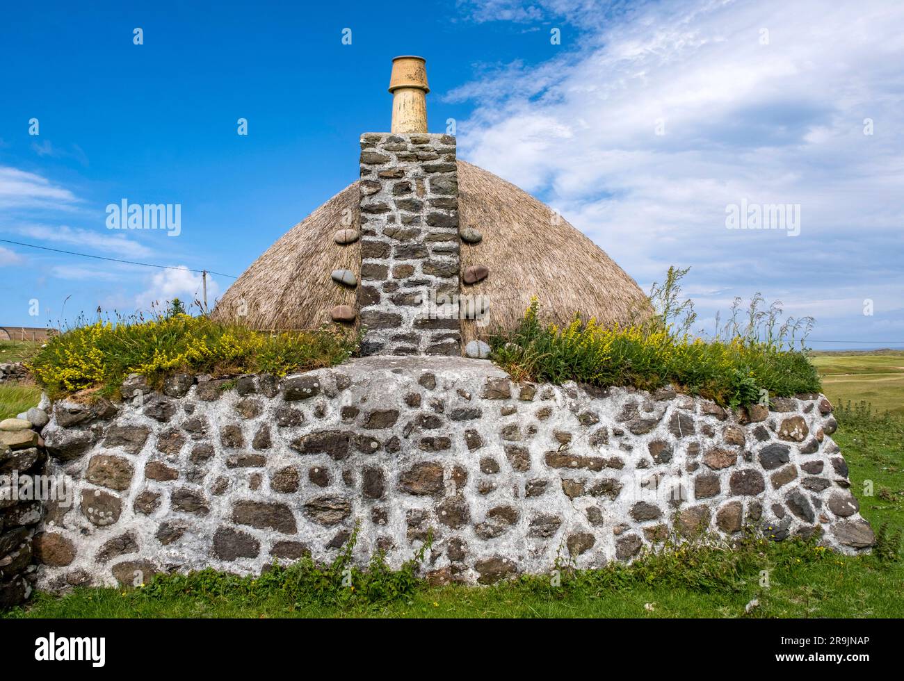 Traditional thatched blackhouse, Balevullin, Tiree, Inner Hebrides ...