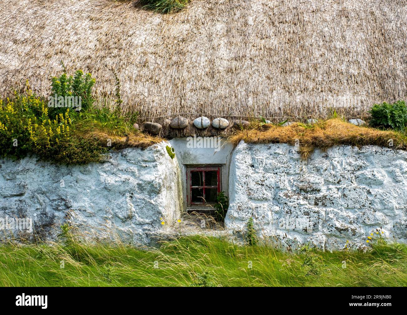 Traditional thatched blackhouse, Balevullin, Tiree, Inner Hebrides ...