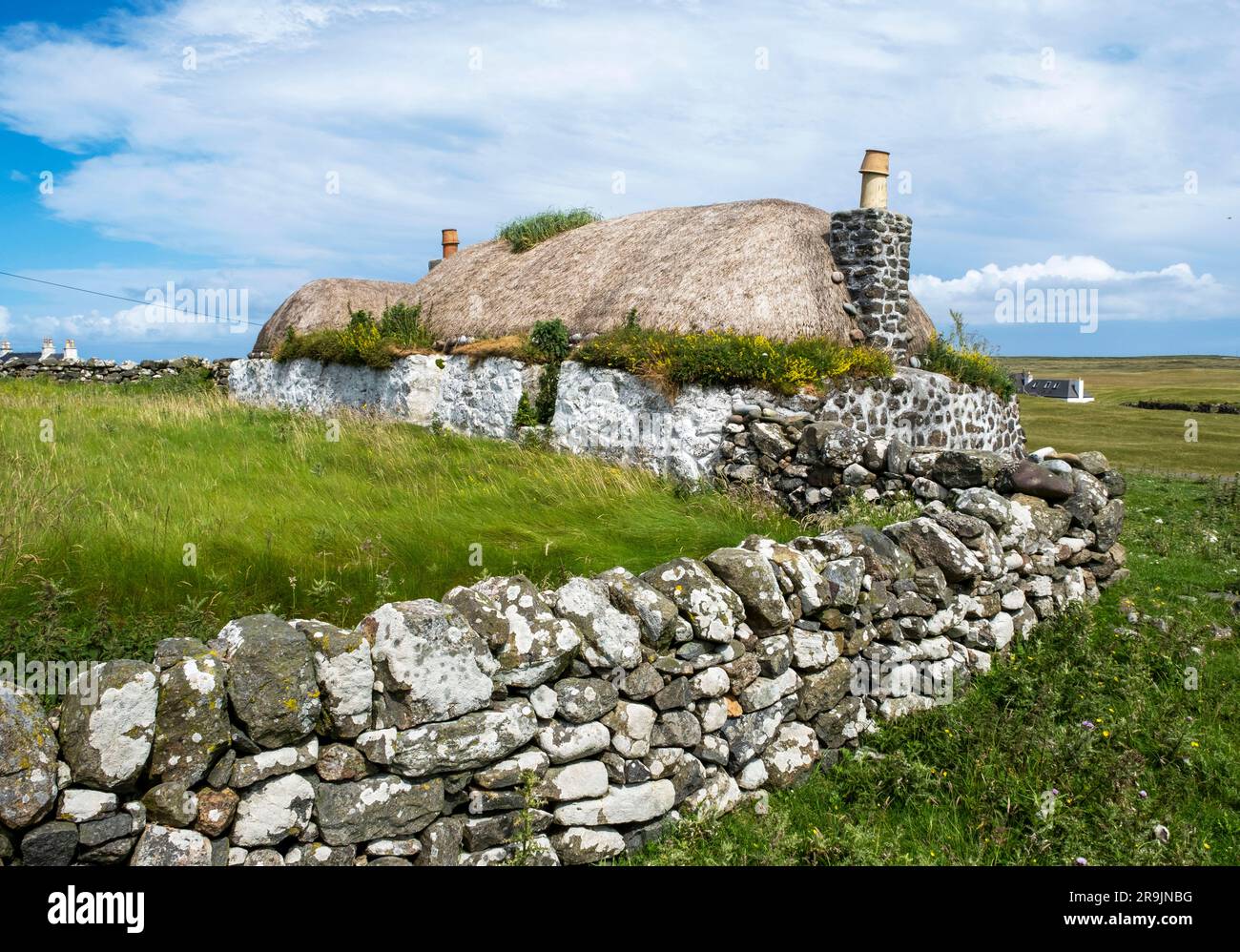 Traditional thatched blackhouse, Balevullin, Tiree, Inner Hebrides ...