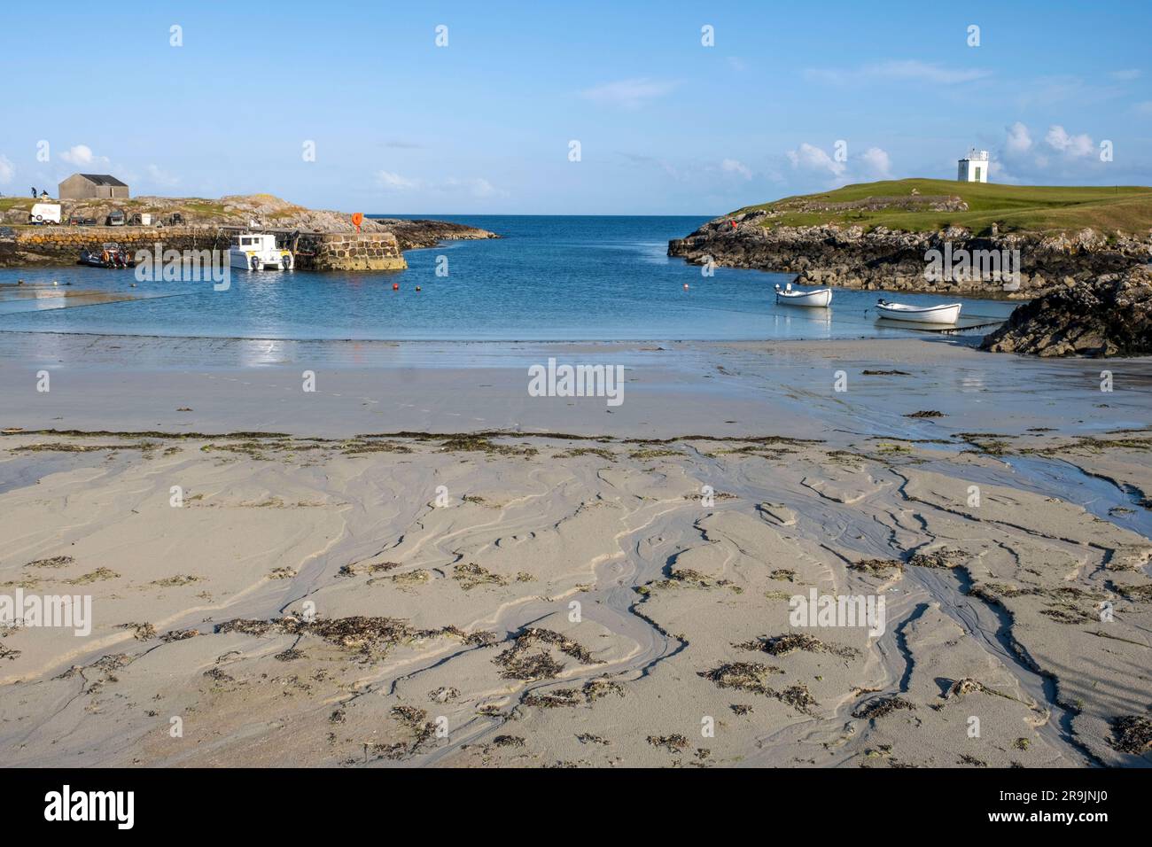 Small boats moored in Scarinish harbour, Isle of Tiree, Inner Hebrides ...