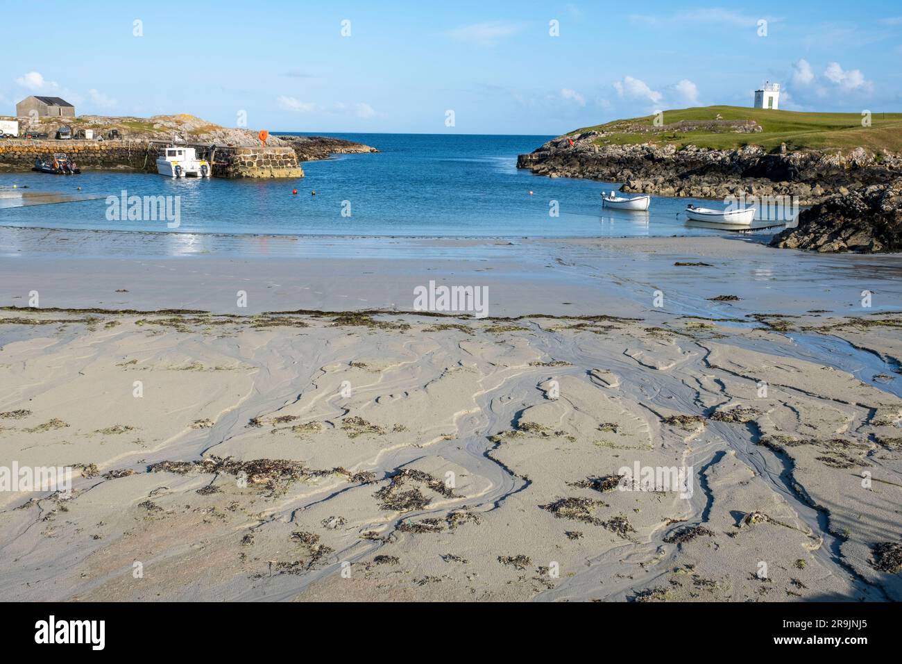 Small boats moored in Scarinish harbour, Isle of Tiree, Inner Hebrides ...