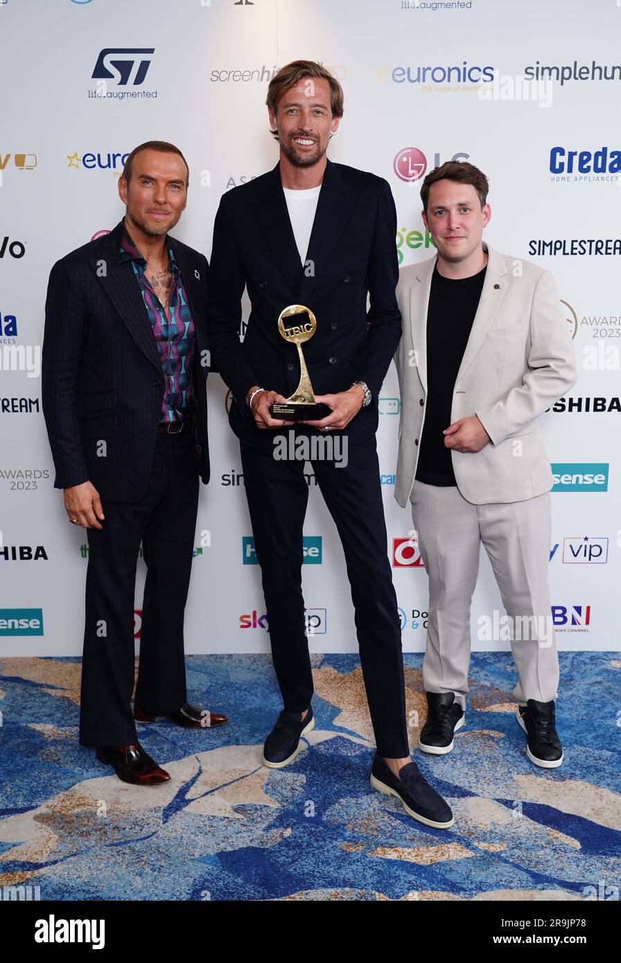 Peter Crouch and Chris Stark, with Matt Goss (left) after winning the ...