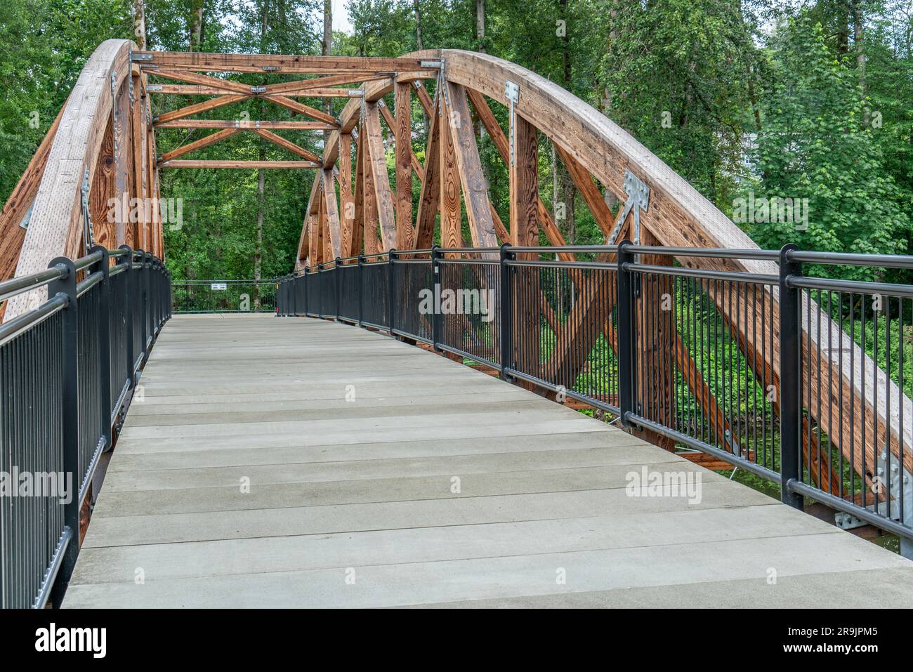 A walkway onto a pedestrian bridge in Bothell, Washington Stock Photo ...