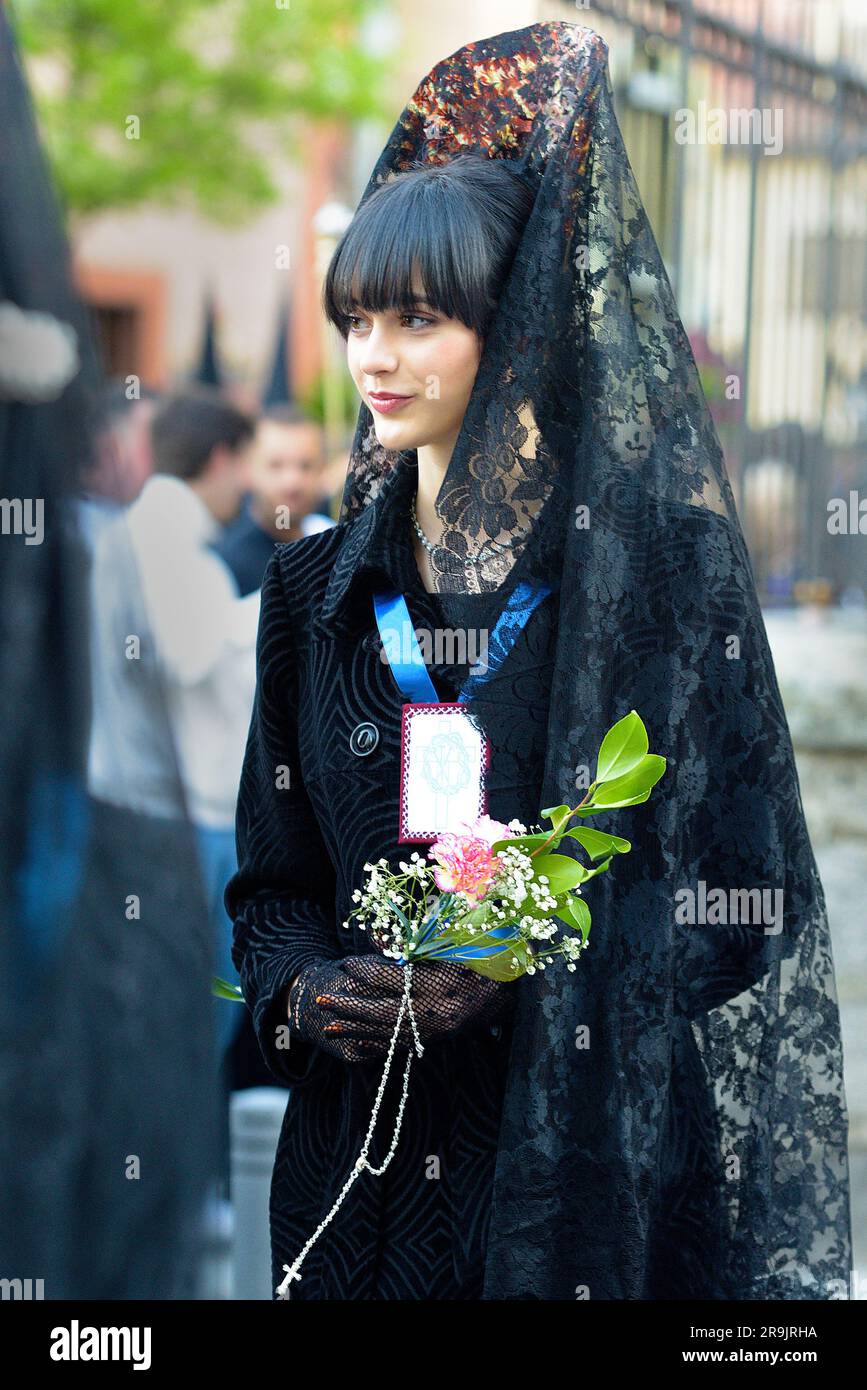 Girl in the Good Friday procession of San Lorenzo de El Escorial ...