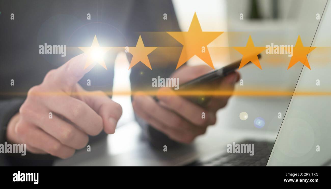 Please rate us banner wtih customer hand give five golden stars Stock ...