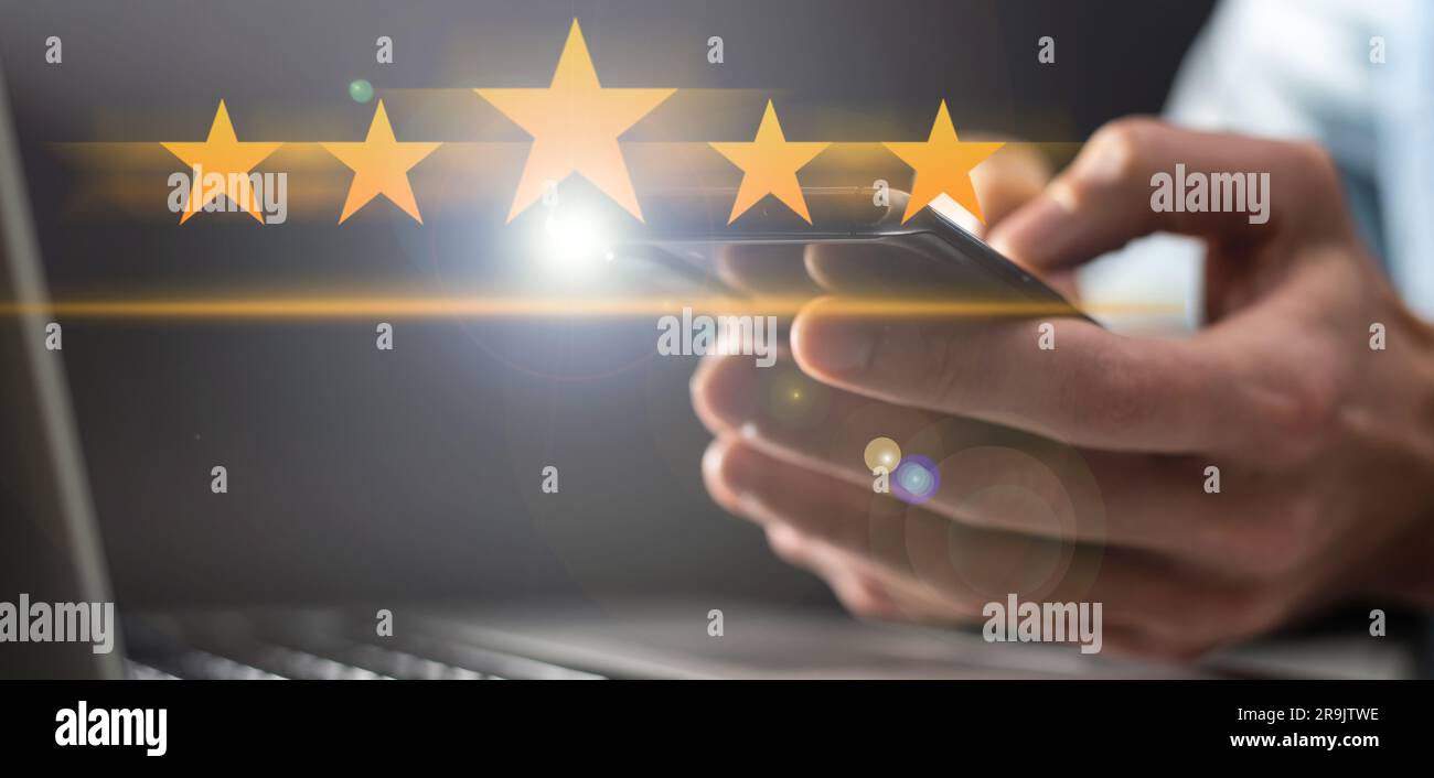 The person's hand pointing at hovering stars. Rating, evaluation Stock ...