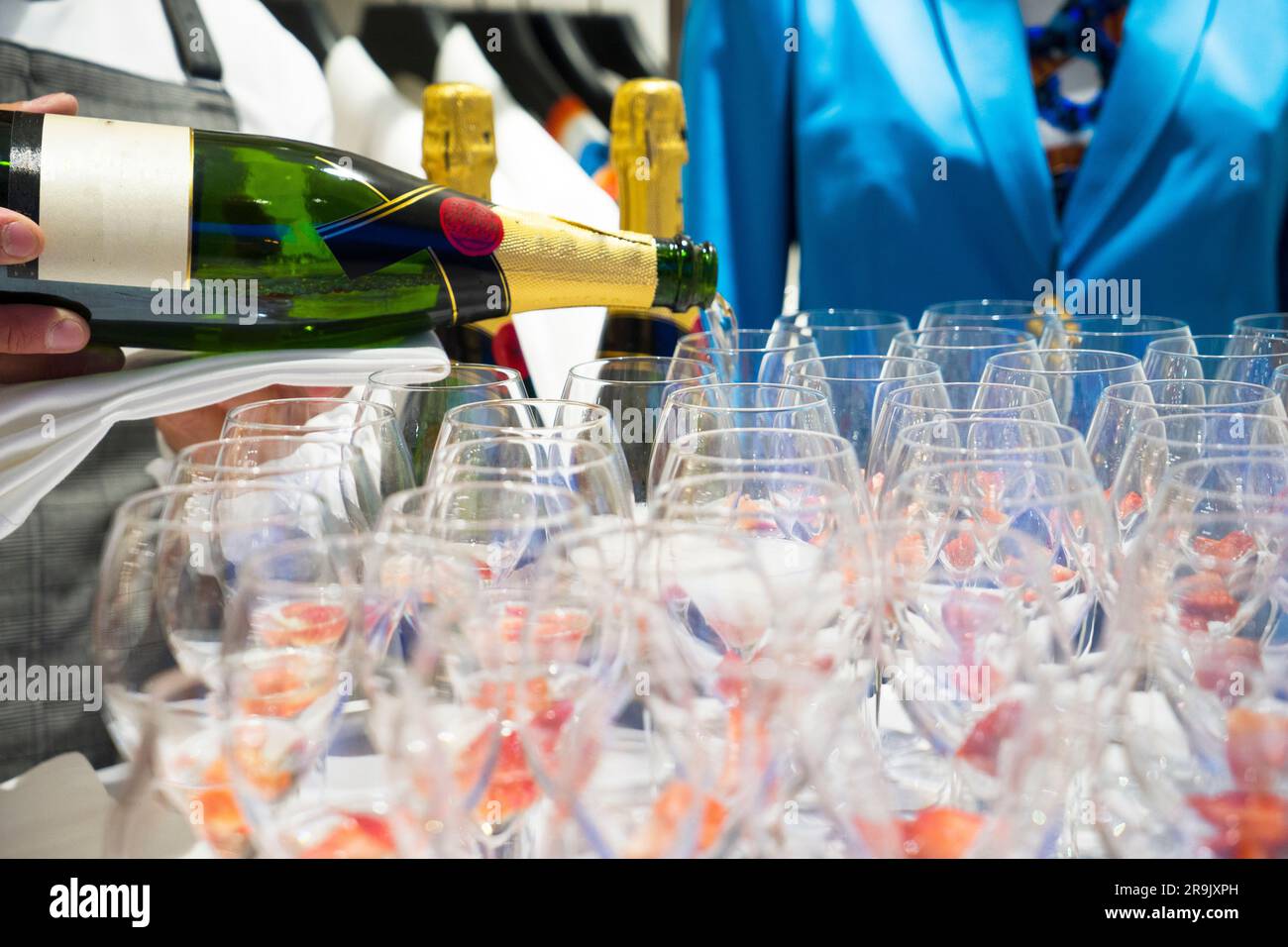 Bartender pouring white wine hi-res stock photography and images - Alamy