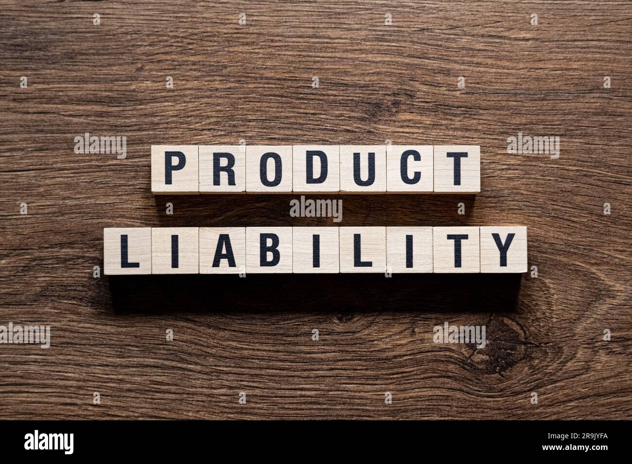 Product liability - word concept on building blocks, text, letters ...