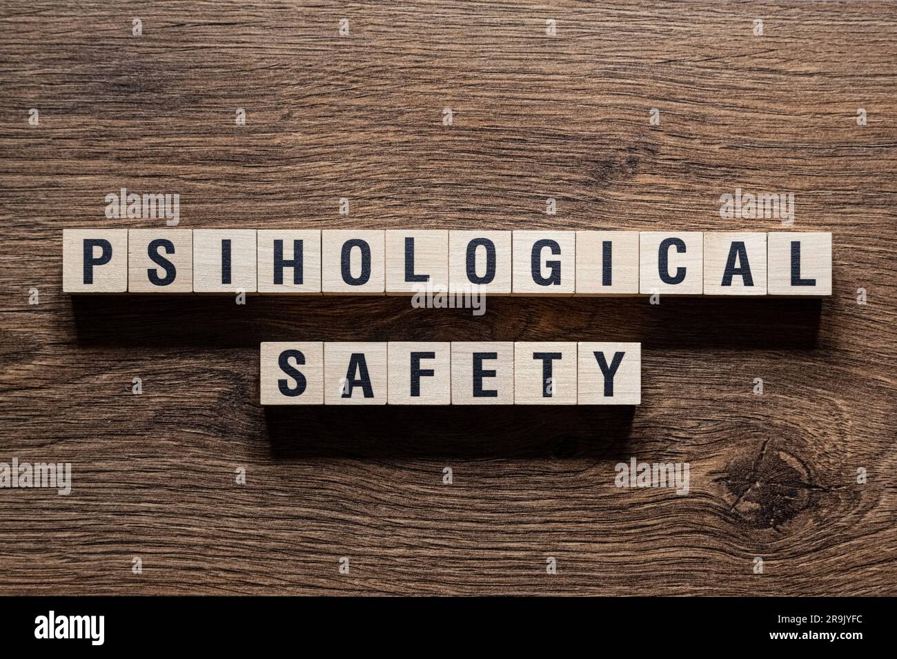 Psyhological safety - word concept on building blocks, text, letters ...