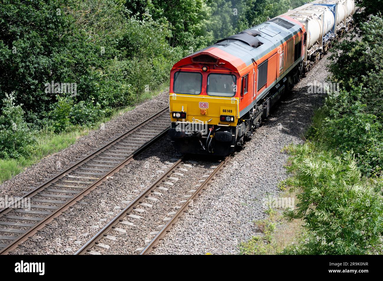 DB class 66 diesel locomotive No. 66149 pulling Interbulk tanks ...