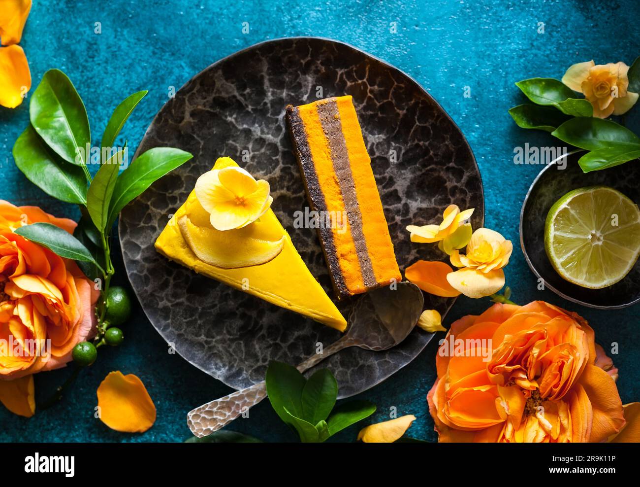 Raw vegan sweet cakes with mango,pineapple, buckthorn and nuts Stock ...