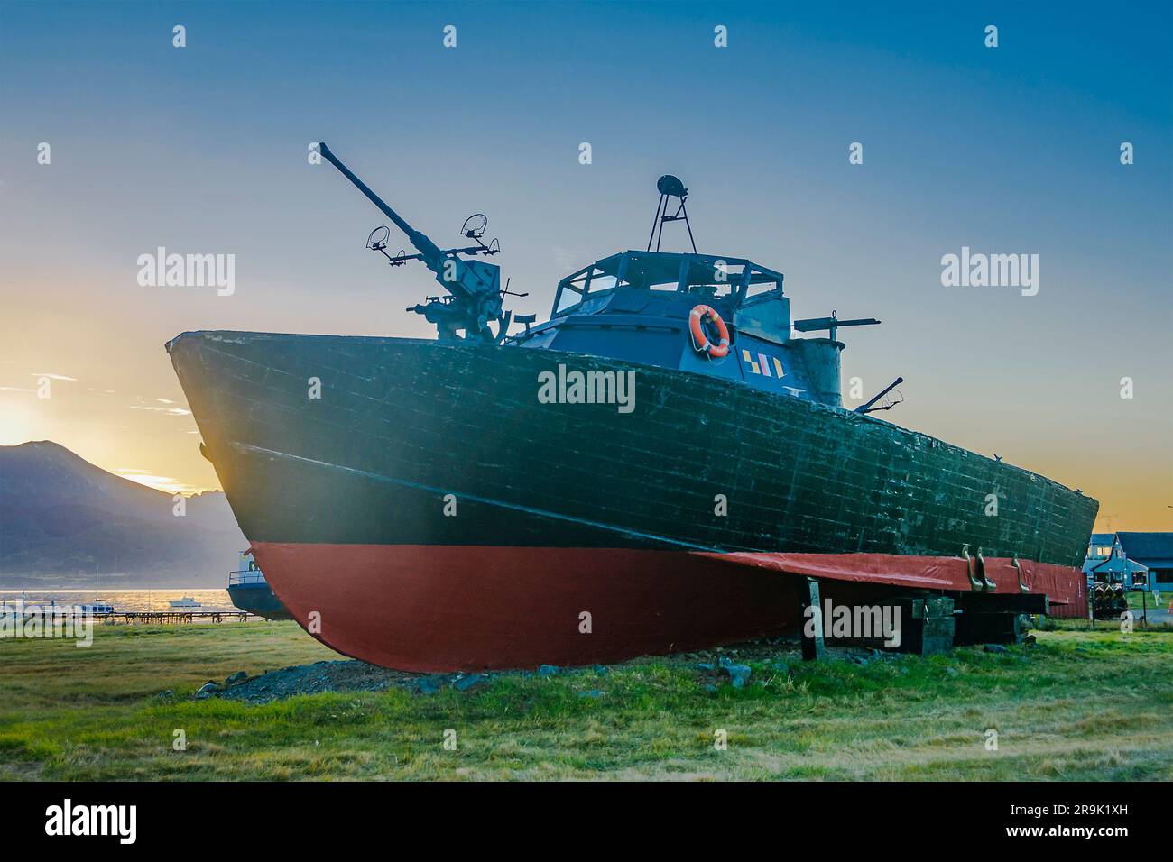 Old safe guard boat parked at grass near ushuaia por, tierra del fuego ...