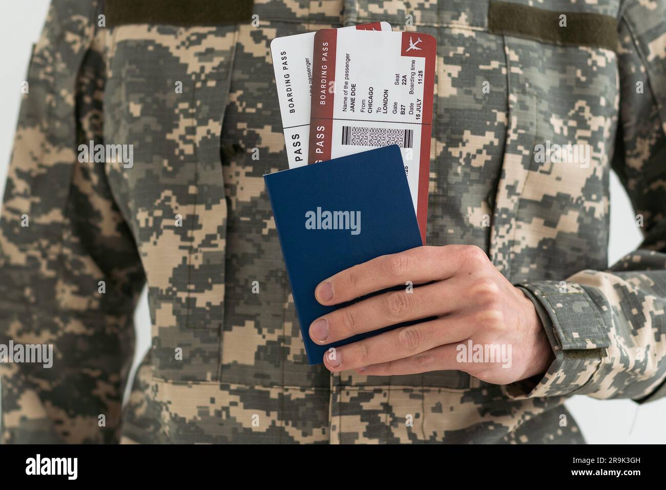 military man holds passports and tickets Stock Photo - Alamy