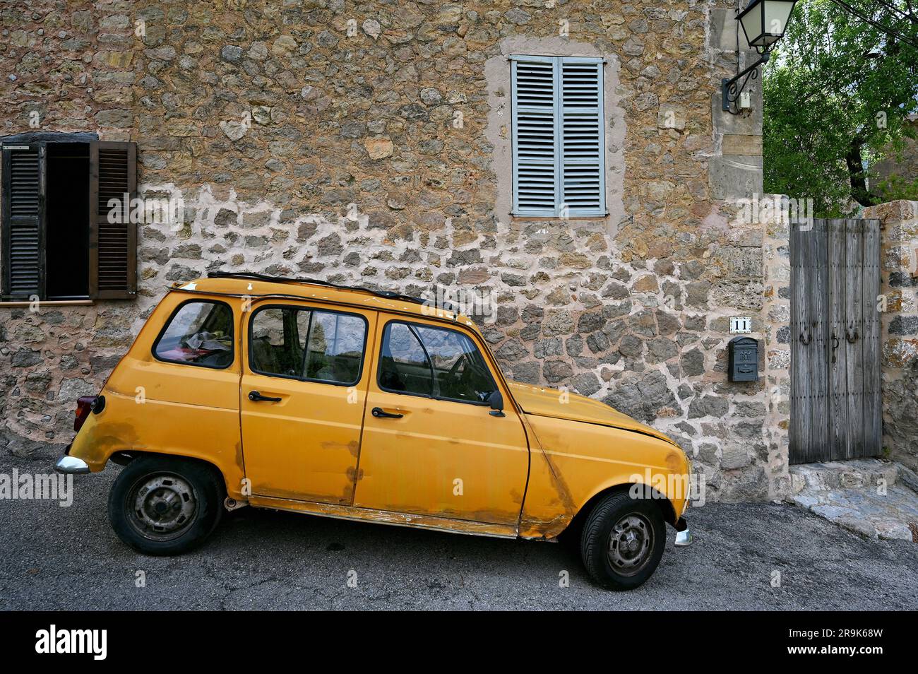 Old Renault 4 in the artist village of Deia on the edge of the ...