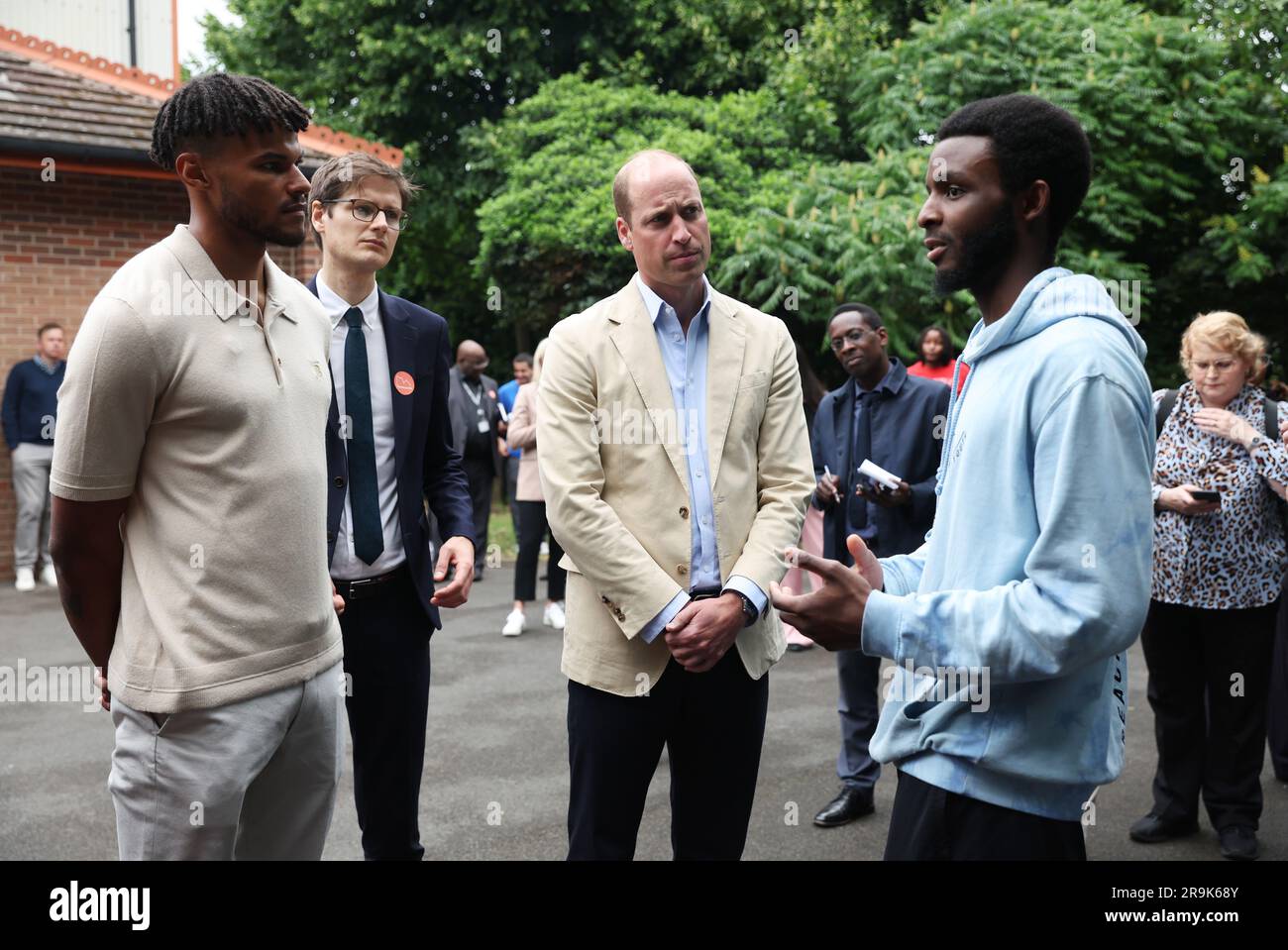 The Prince of Wales with footballer Tyrone Mings (left) during a visit ...