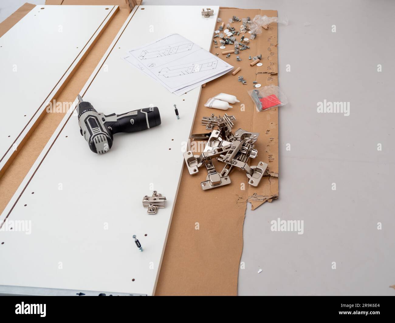 Assembly of furniture and tools for self-assembly of furniture on the ...