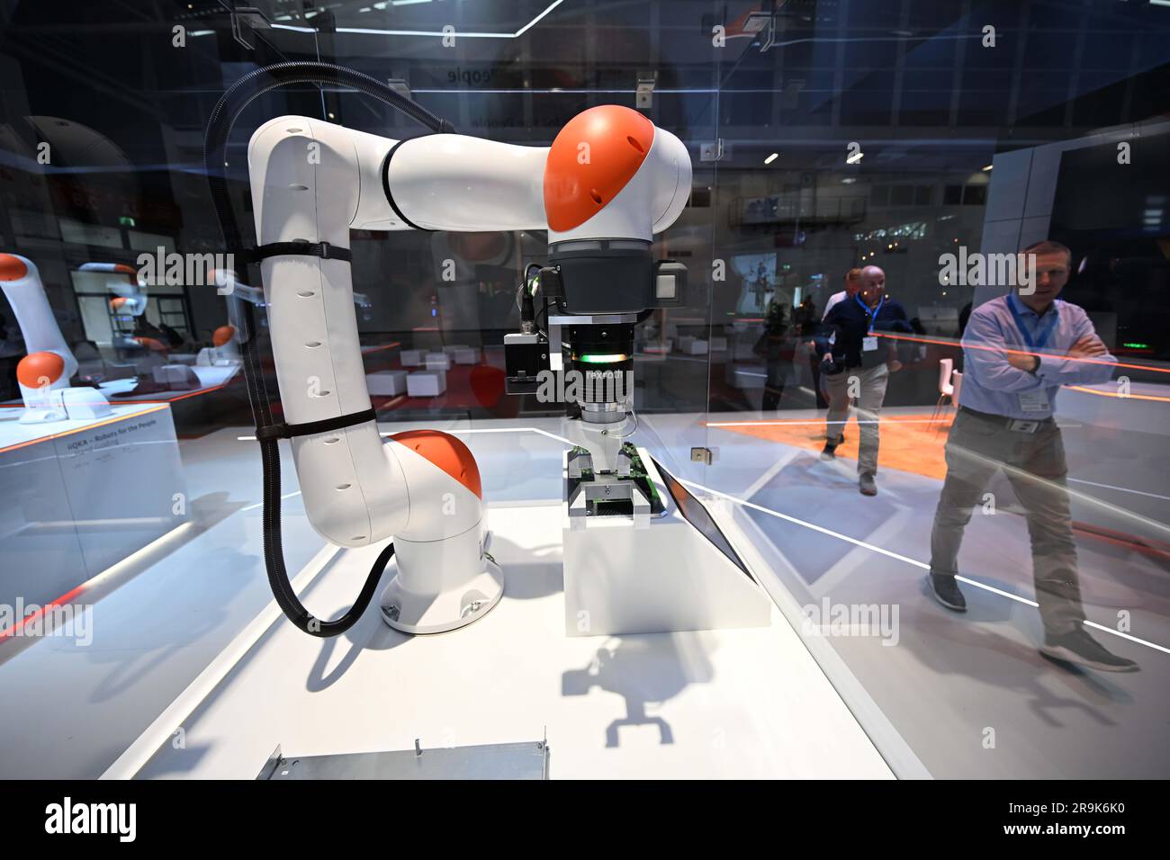 Munich, Germany. 27th June, 2023. A robot arm from the KUKA company is ...