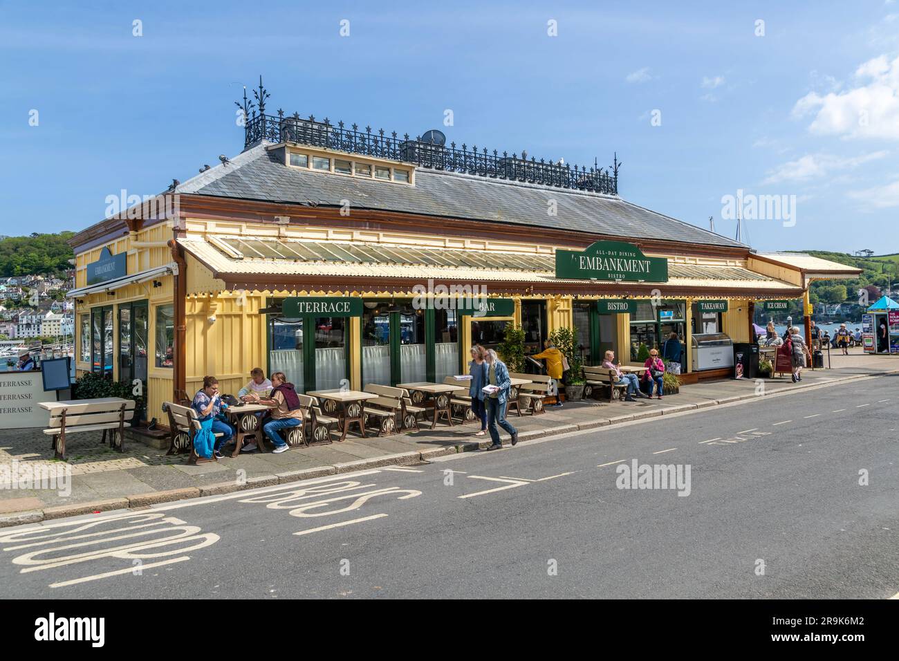People sitting outside Embankment cafe bistro, Dartmouth, Devon ...