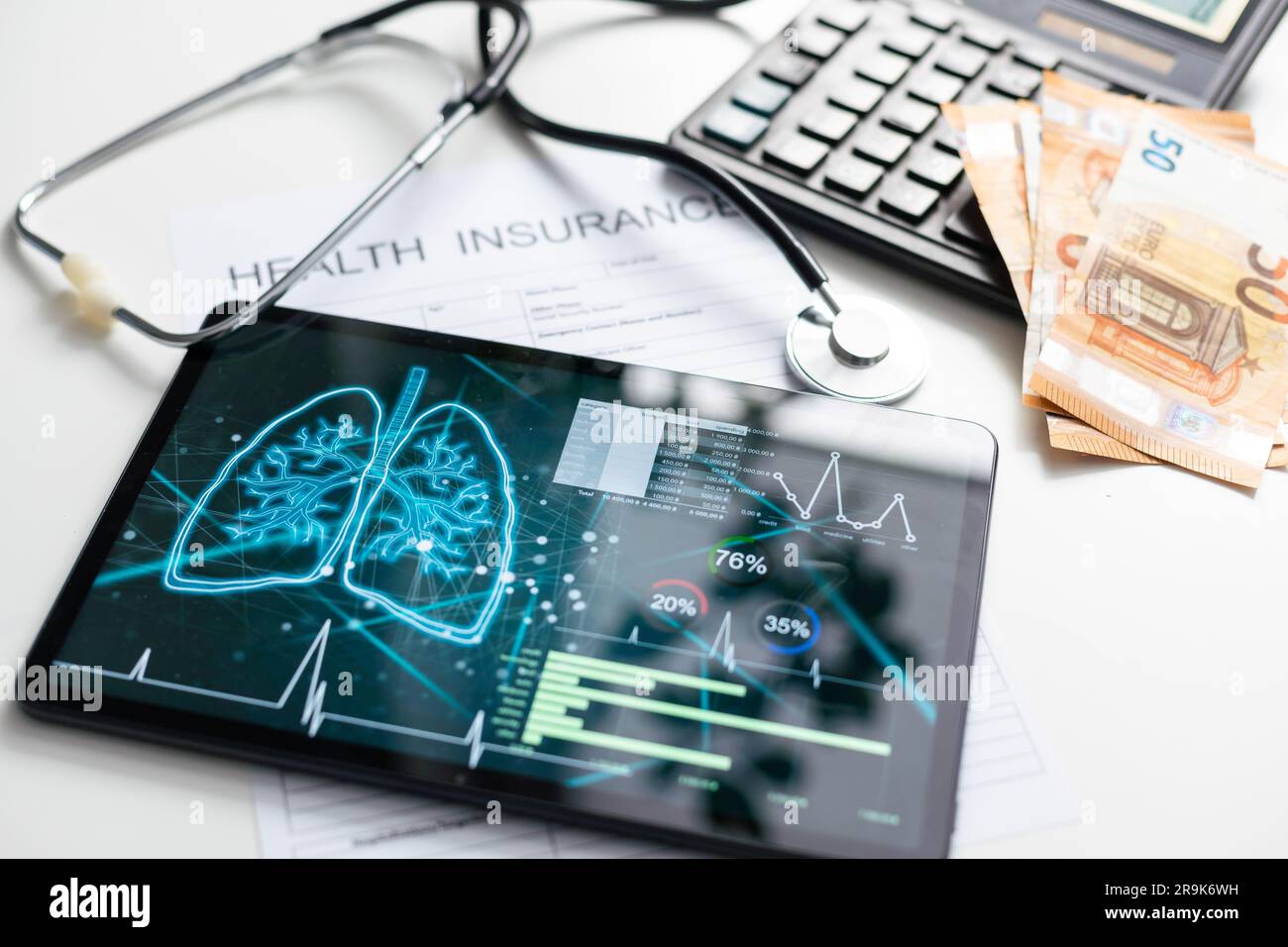 Modern social health insurance program. Tablet computer with healthcare ...