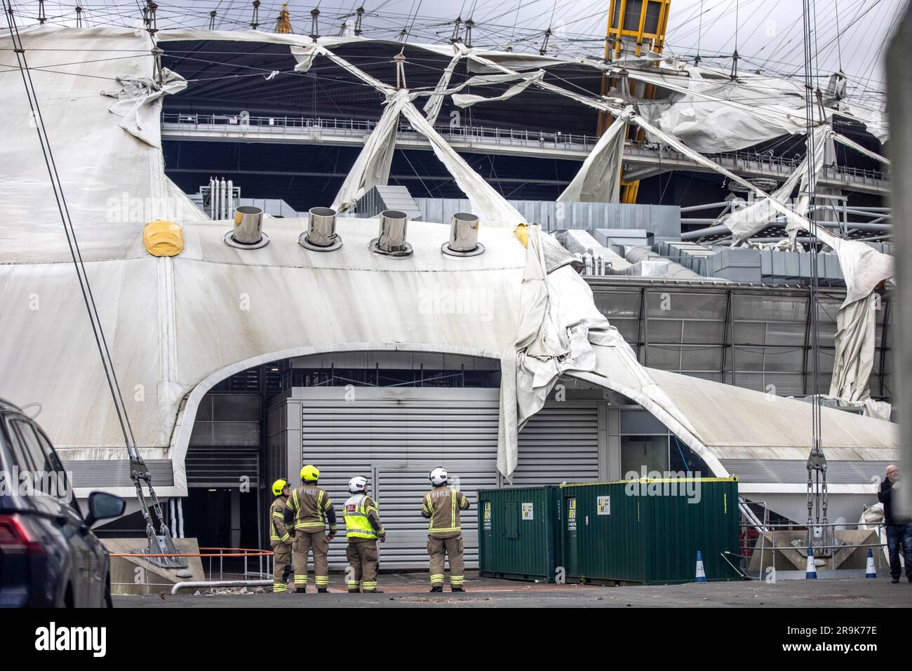 Fireman attend the scene at O2 Arena where the tarpaulin ripped due to ...