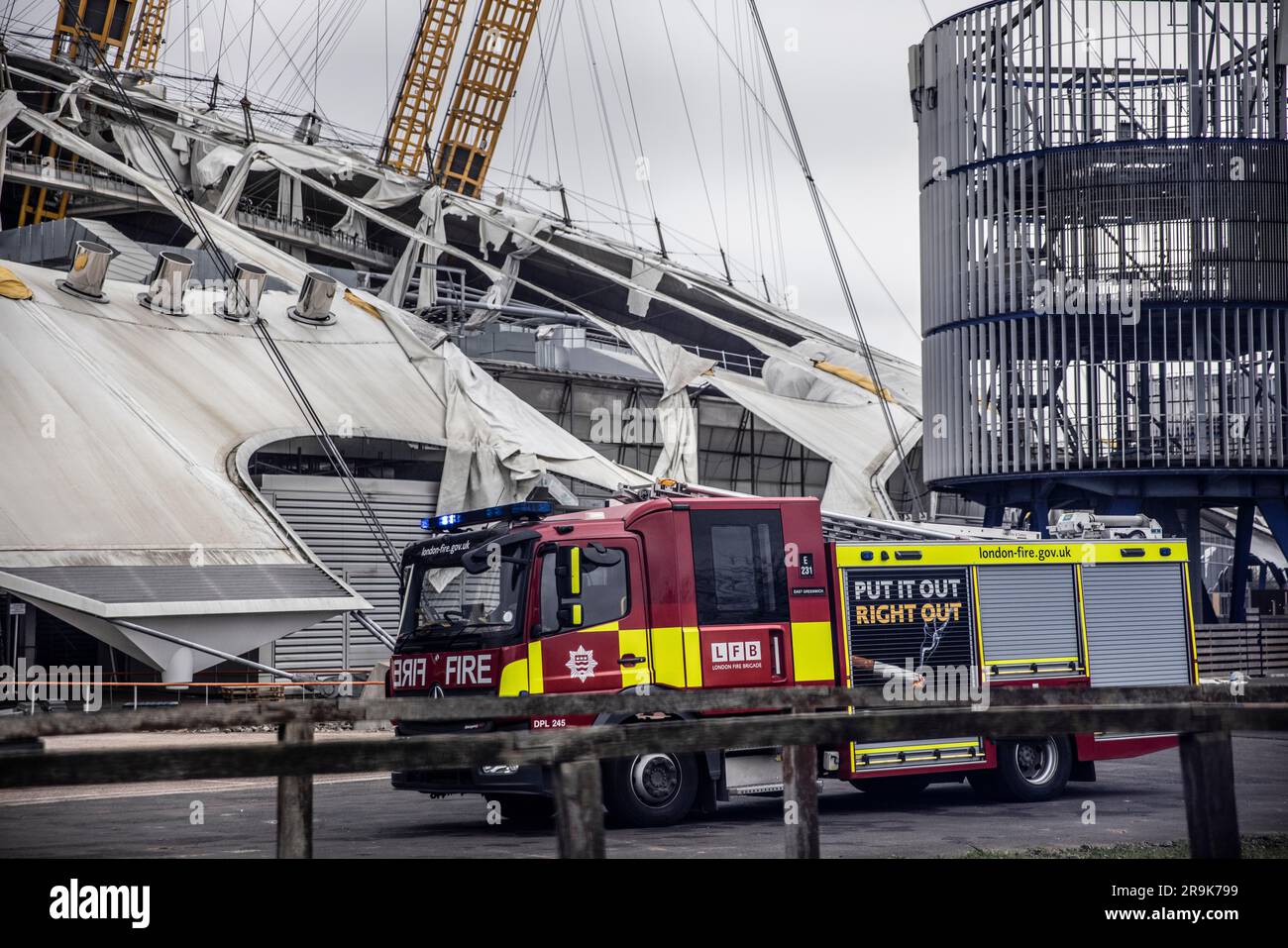 Fireman attend the scene at O2 Arena where the tarpaulin ripped due to ...
