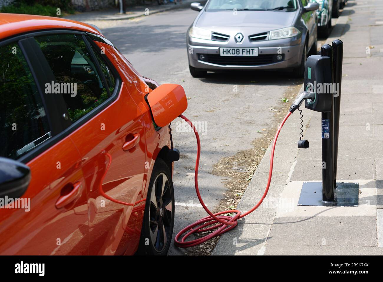 A car is being charged at an electric charging point in Worthing ...