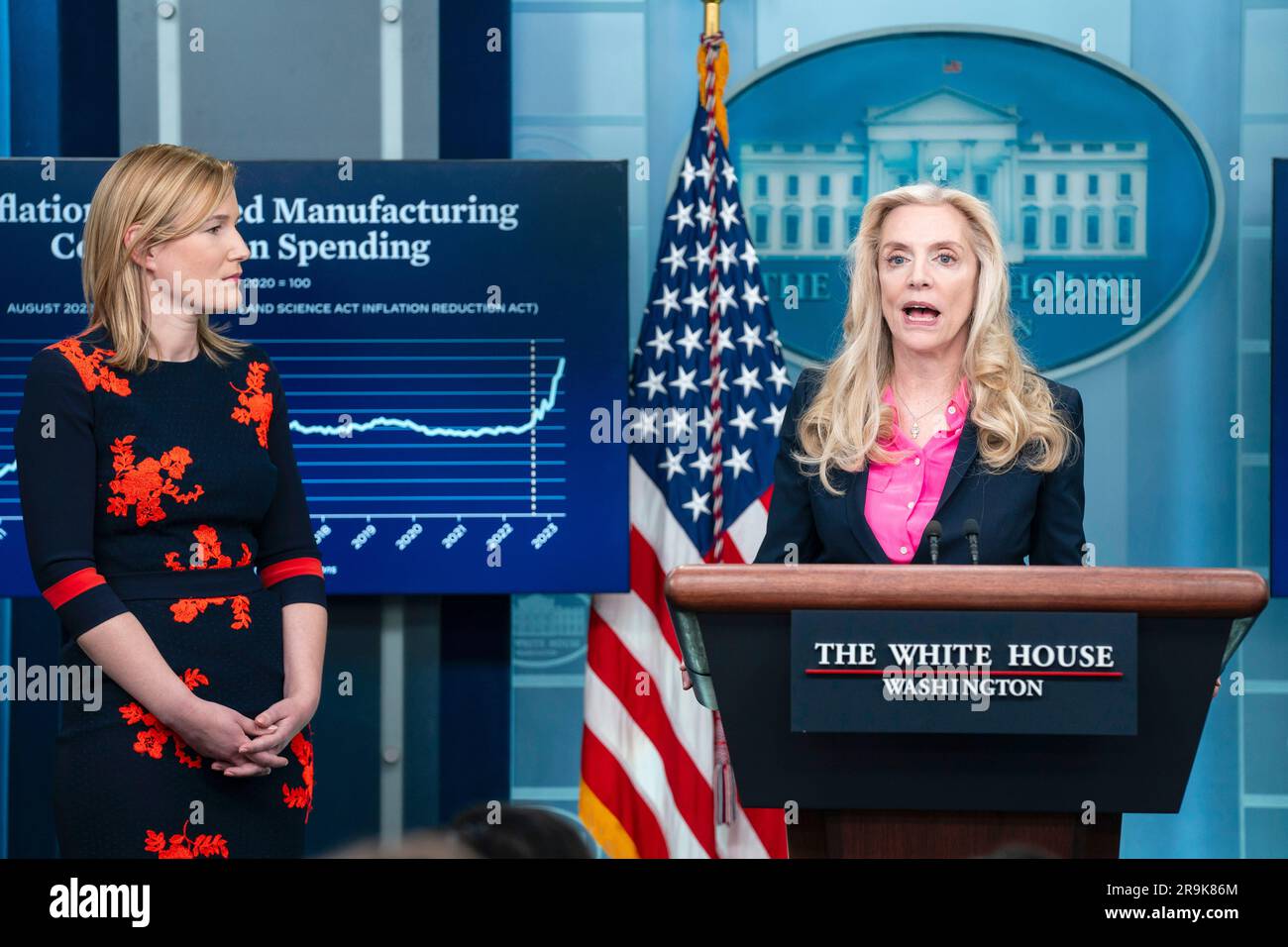 White House Deputy Press Secretary Olivia Dalton listens as Director of ...