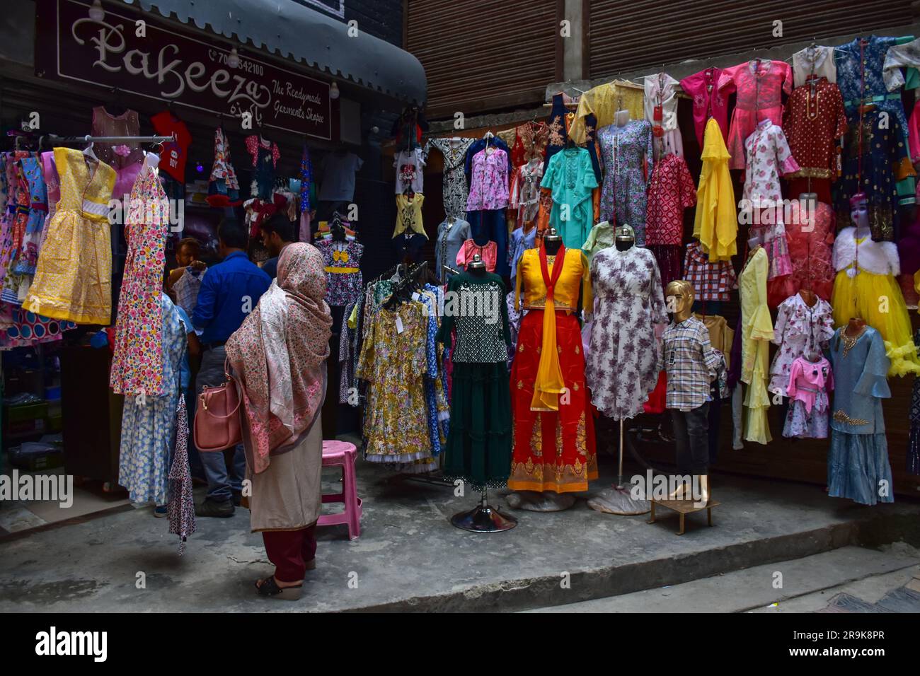 Srinagar, India. 27th June, 2023. Kashmiri Muslims shop ahead of the ...